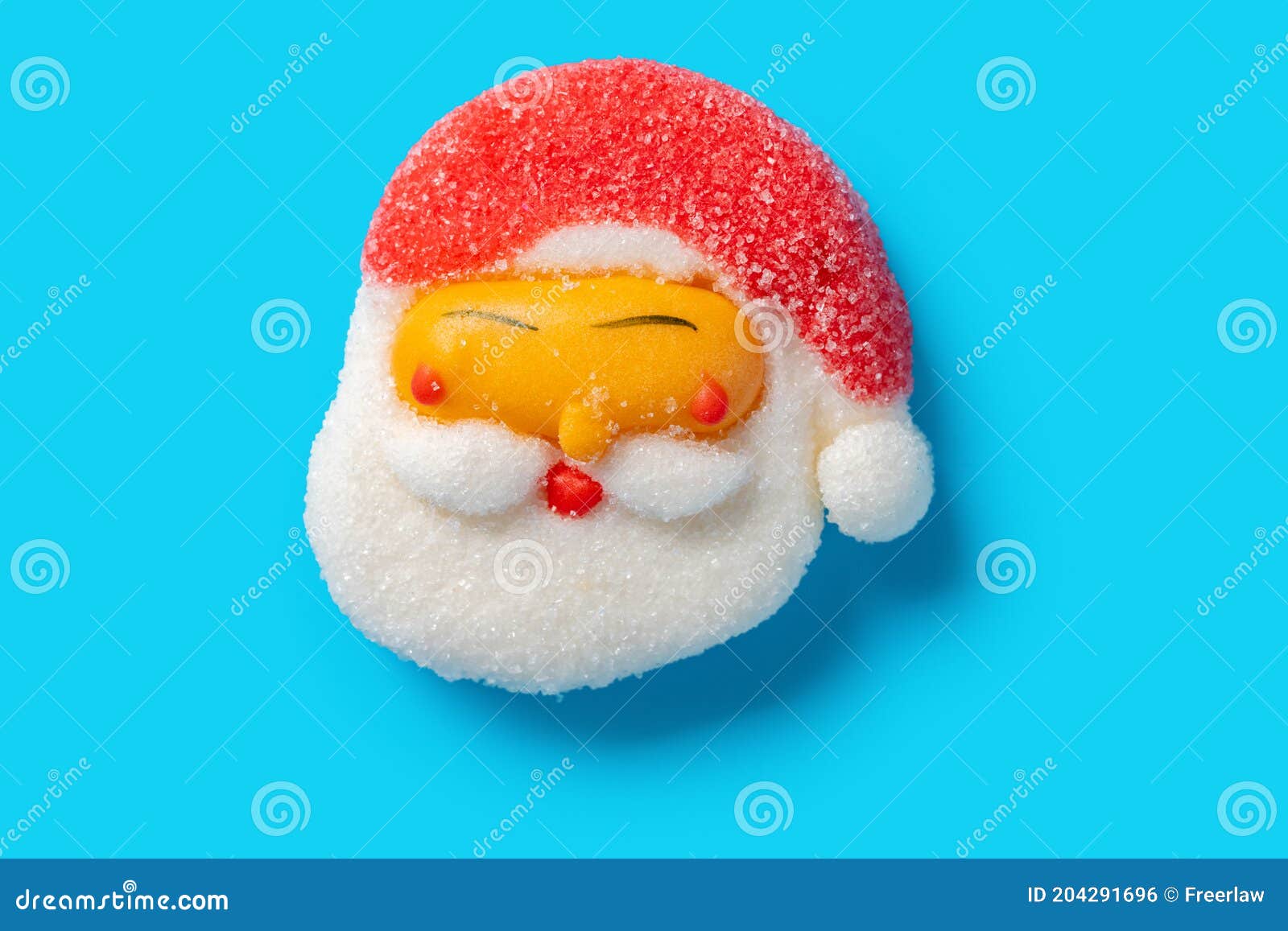 A Cute Santa Claus Candy on a Blue Background Stock Photo - Image of ...