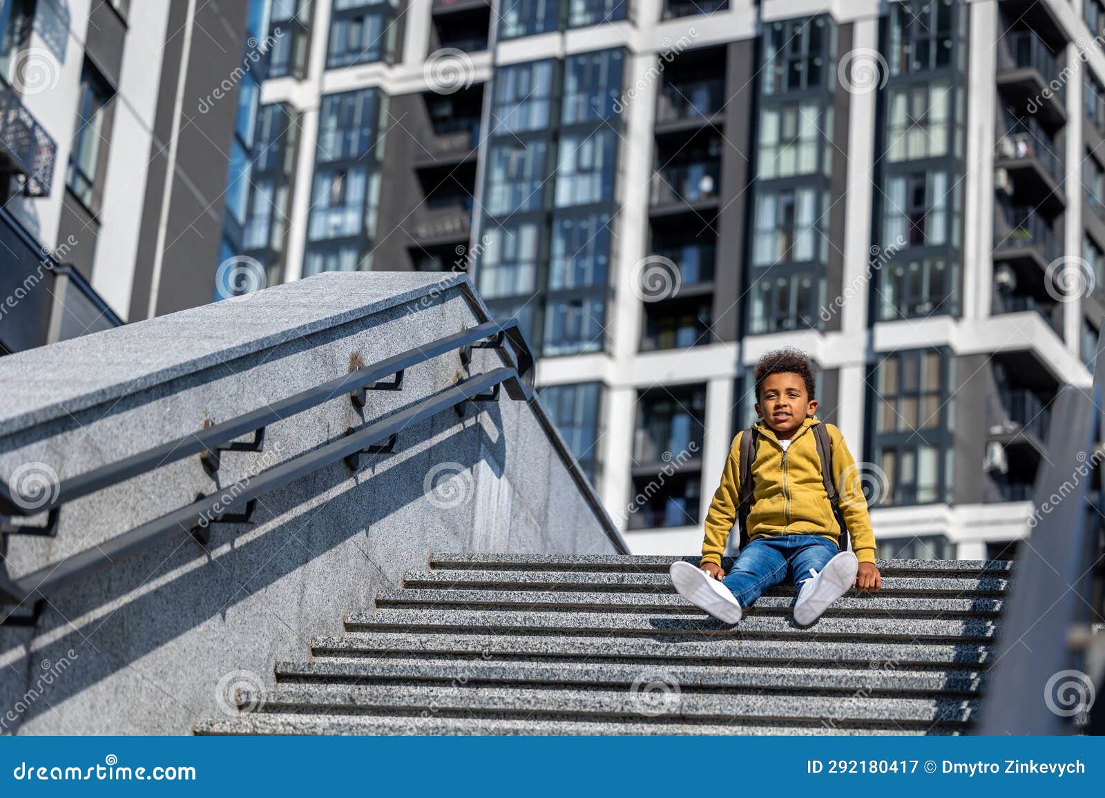 Cute Schoolboy Sitting on the Steps and Resting Stock Image - Image of ...