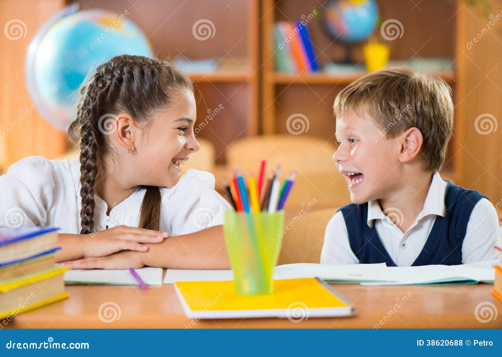 Cute Schoolchildren Having Fun in Classroom Stock Photo - Image of ...