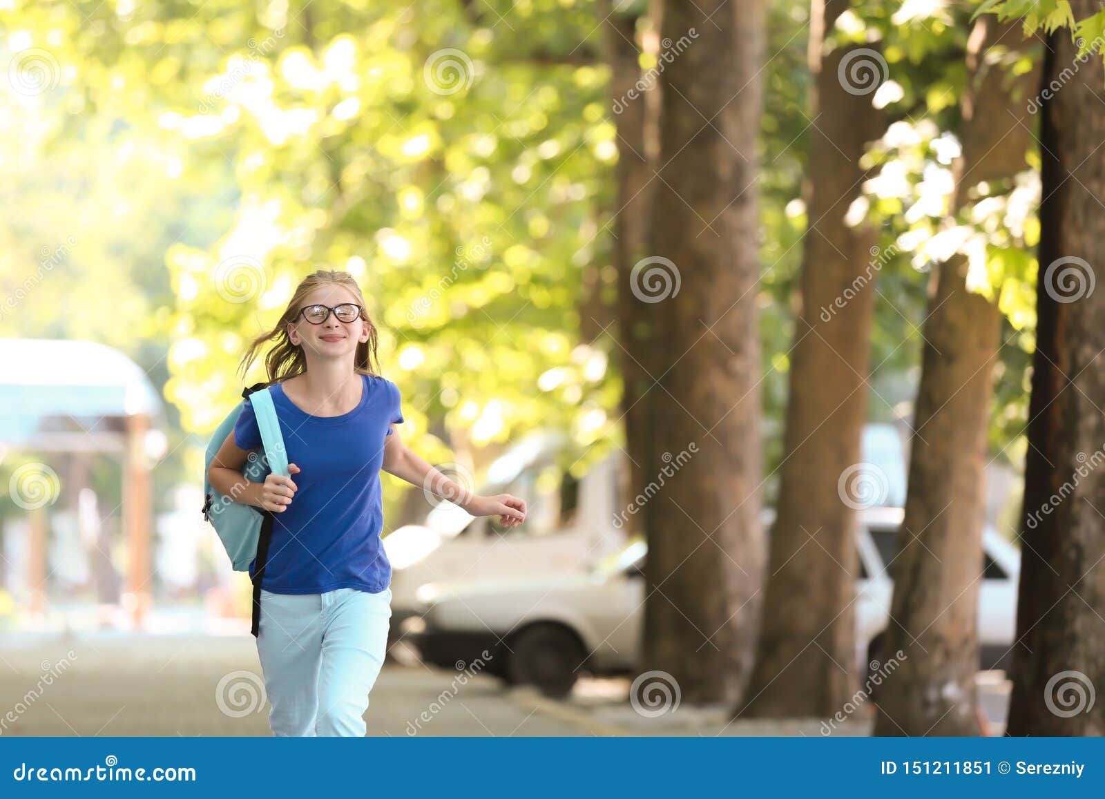 Cute Schoolgirl with Backpack Running Outdoors Stock Image - Image of ...