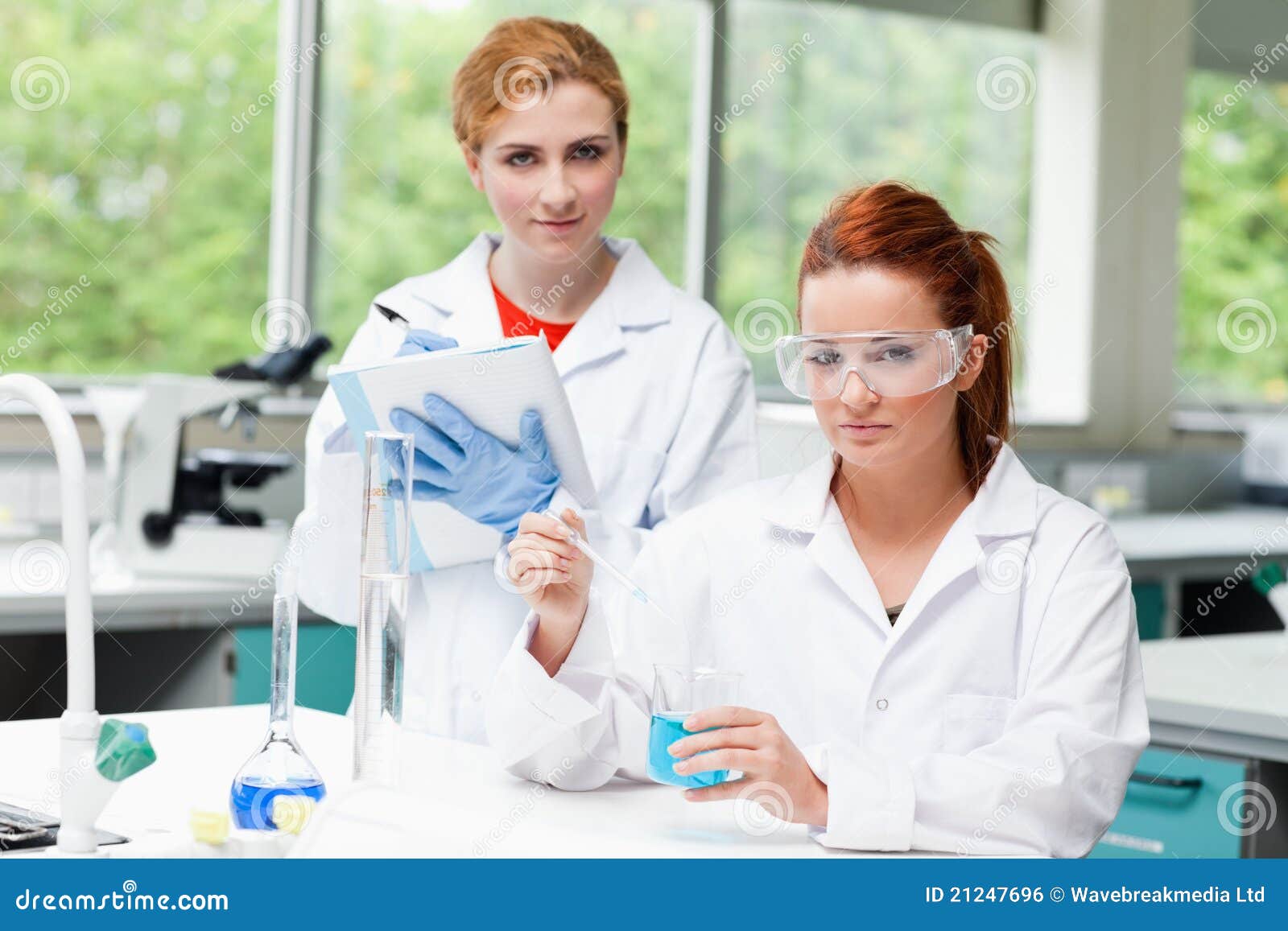 Cute Science Students Doing an Experiment Stock Photo - Image of ...