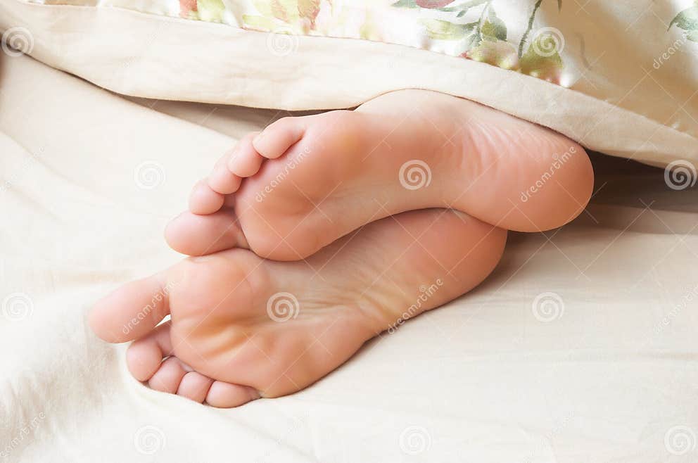 Cute seeping feet stock photo. Image of home, bedroom - 4336724