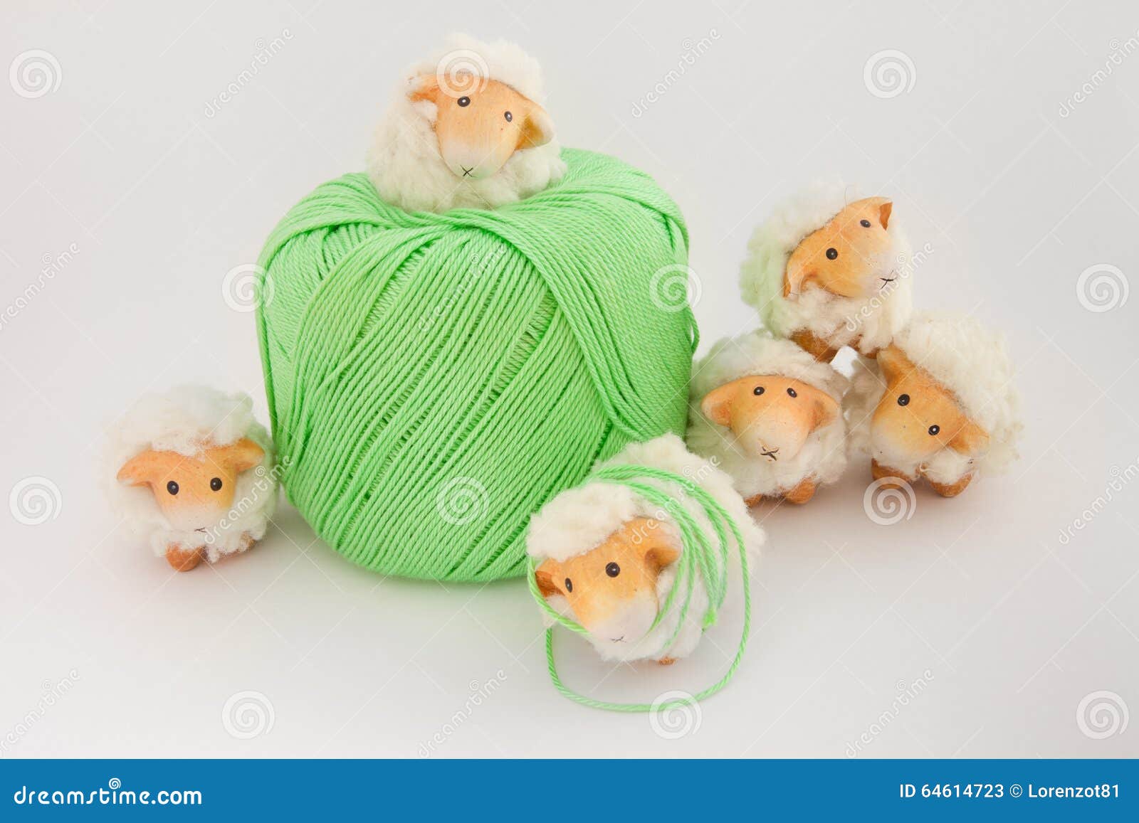 Cute Sheep Playing Together with a Ball of Green Wool Stock Image ...
