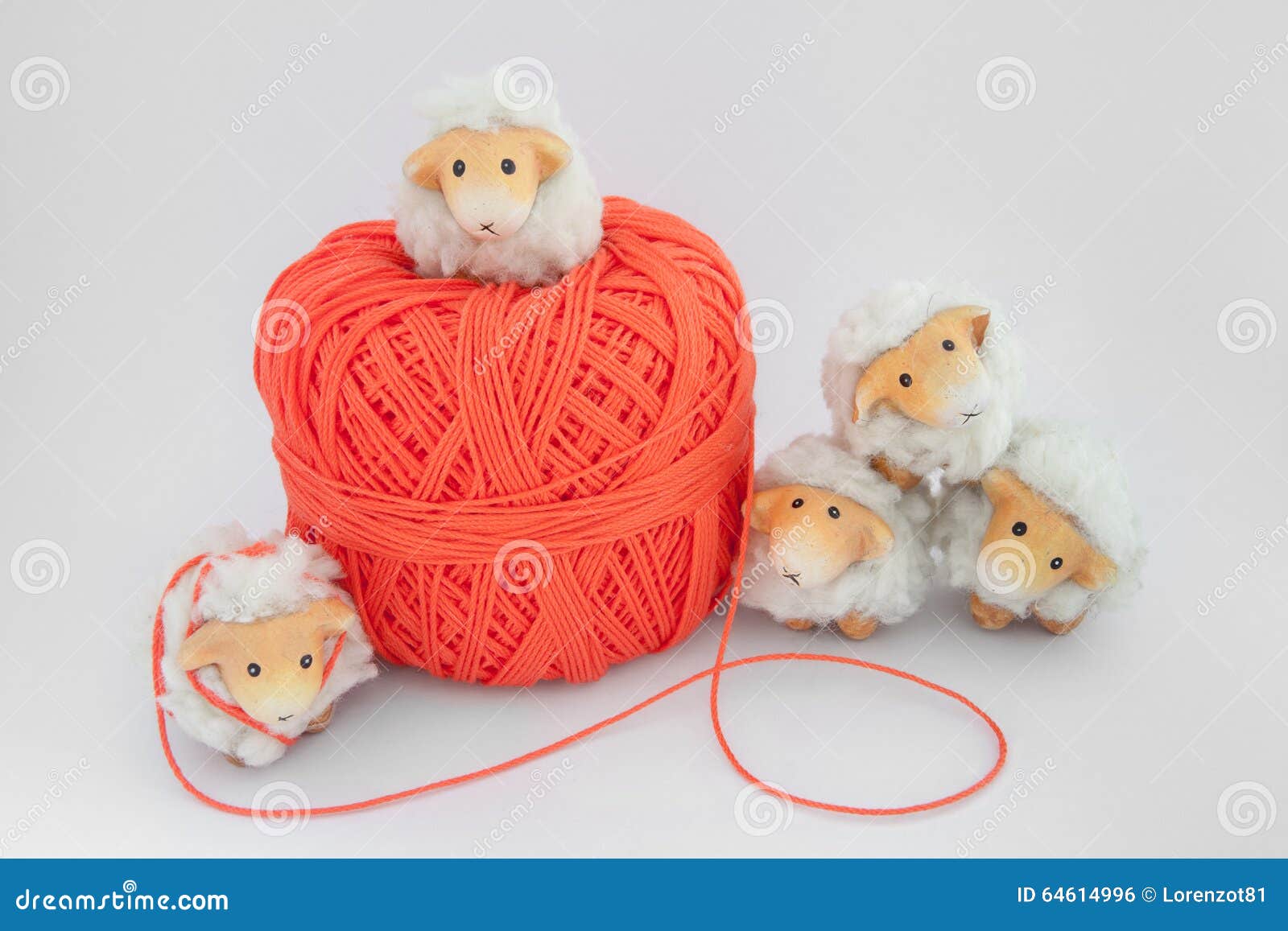 Cute Sheep Playing Together with a Ball of Red Wool Stock Photo - Image ...