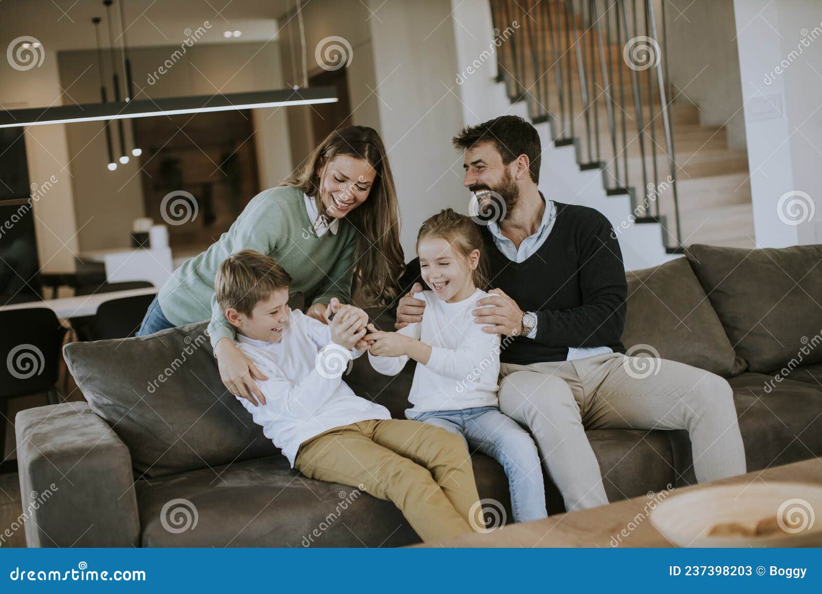 Siblings Fighting Over TV Remote Control at Home Stock Image - Image of ...