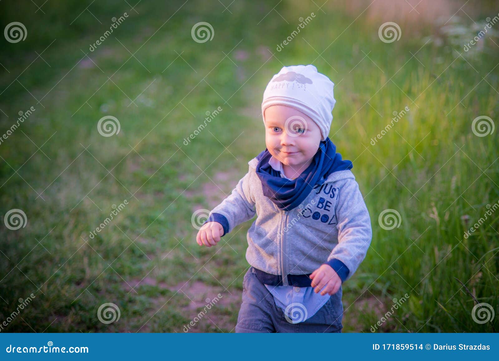 Cute small boy in nature stock photo. Image of childhood - 171859514