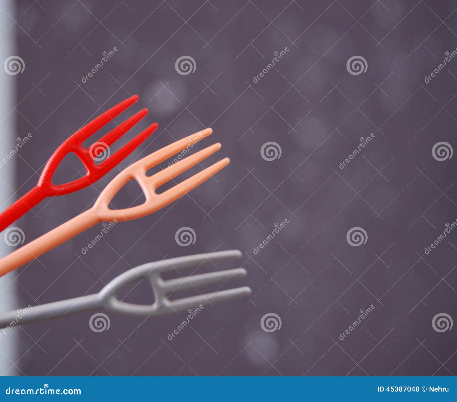 Cute small plastic forks stock photo. Image of people - 45387040