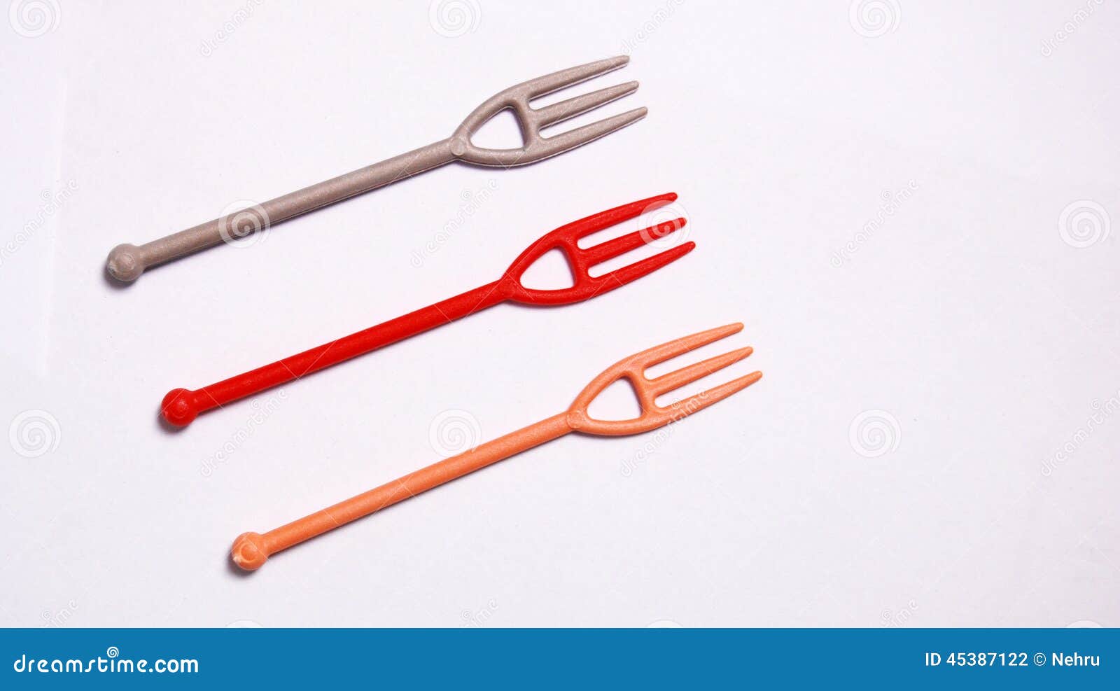 Cute small plastic forks stock photo. Image of forks - 45387122