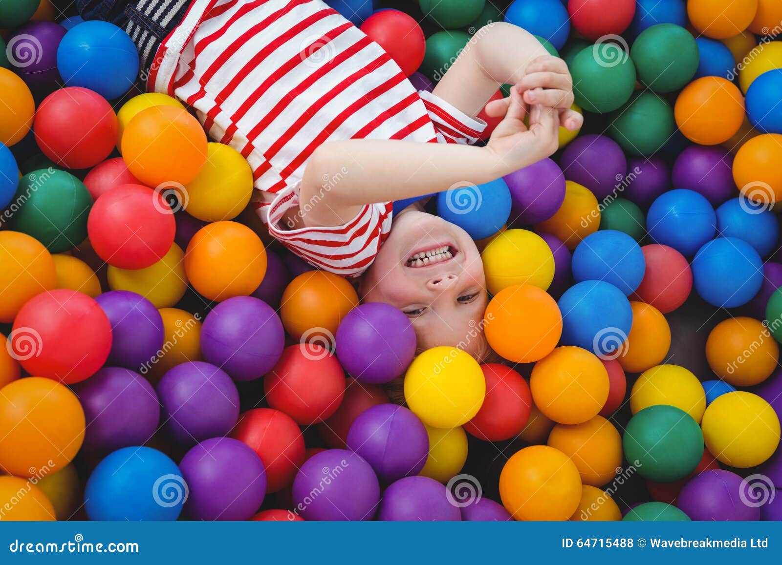 Cute Smiling Boy in Sponge Ball Pool Stock Photo - Image of messing ...