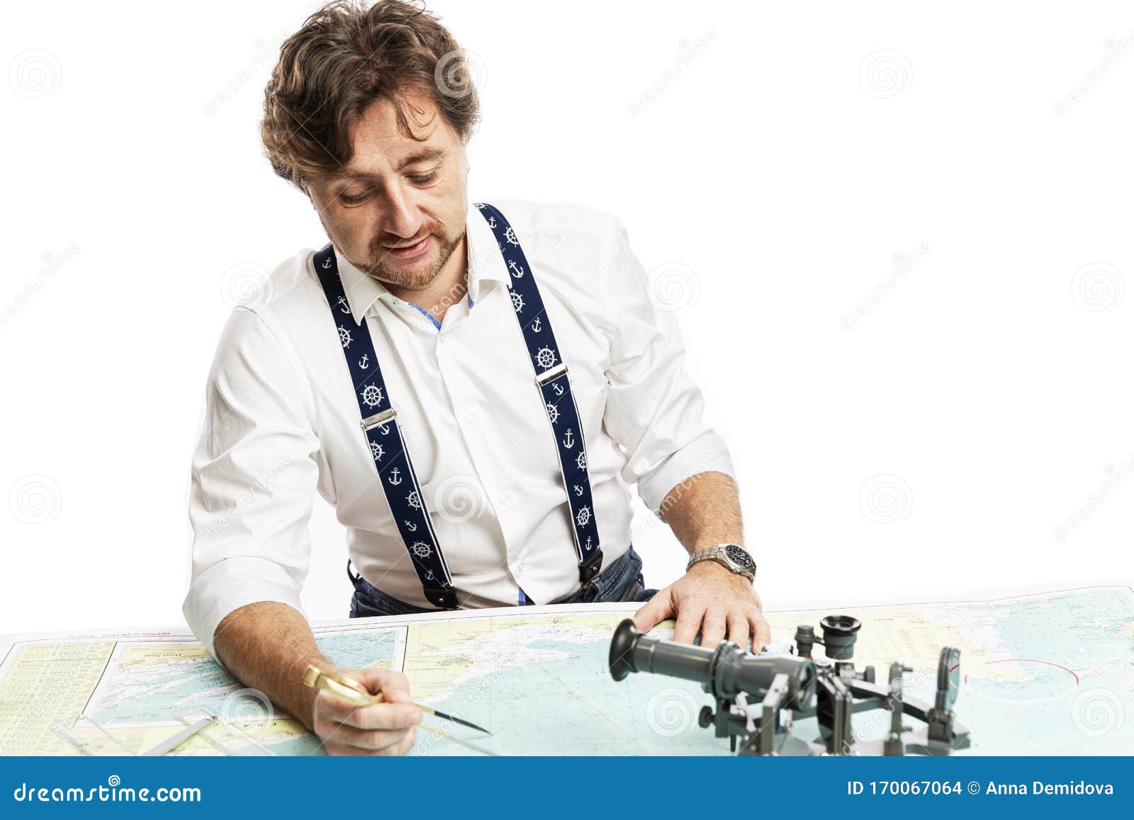 A Cute Smiling Captain Measures the Distance on a Map with a Compass ...