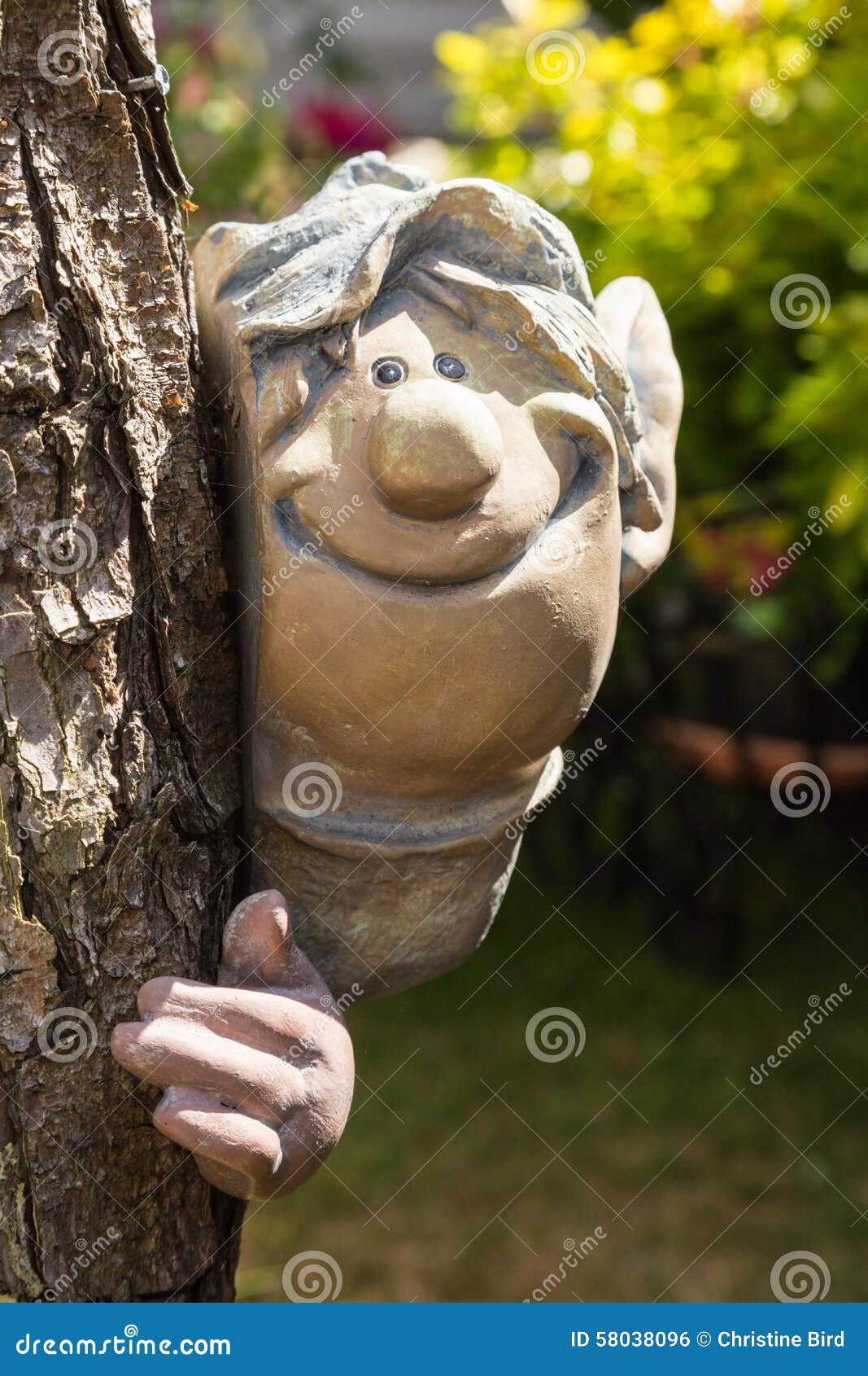 Cute, Smiling Garden Ornament Stock Photo - Image of garden, face: 58038096