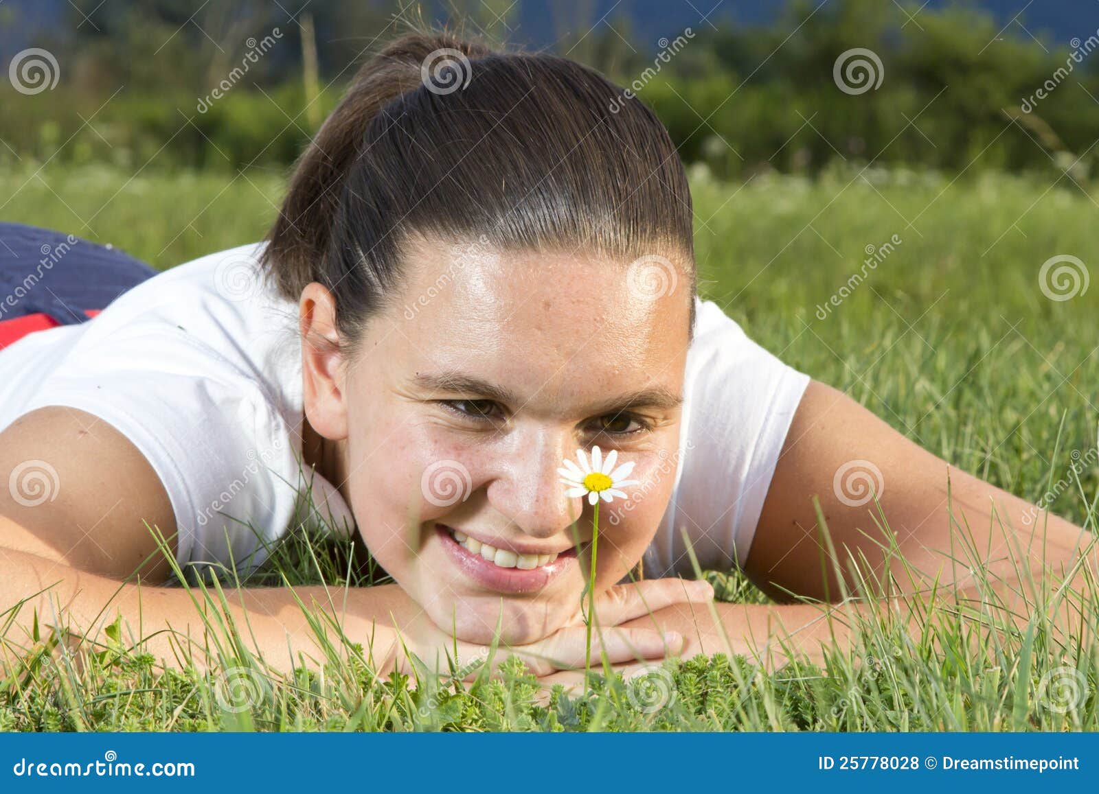 Cute Smiling Girl with a Daisy Stock Photo - Image of person, caucasian ...