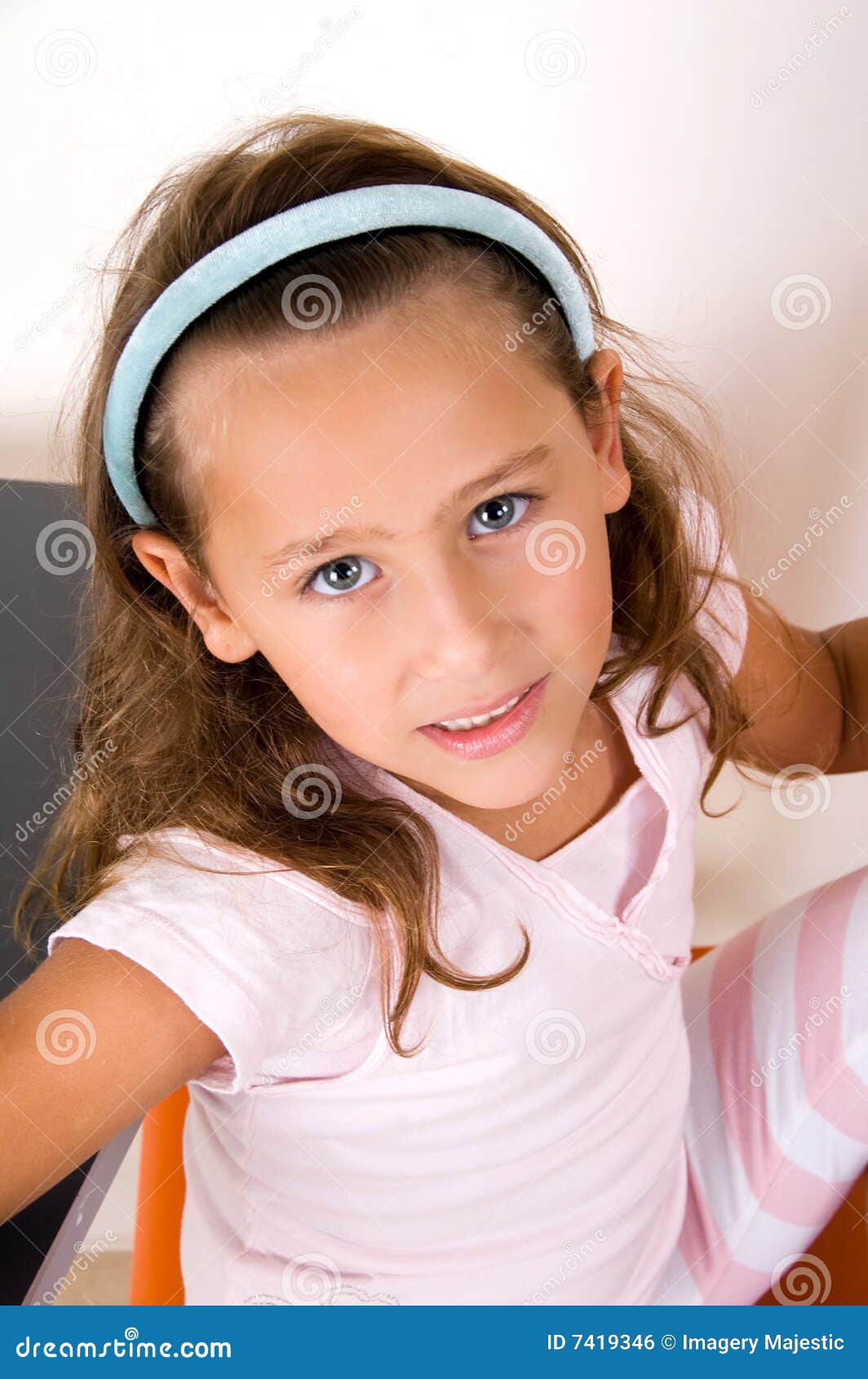 Cute Smiling Girl Looking at Camera Stock Photo - Image of playful ...