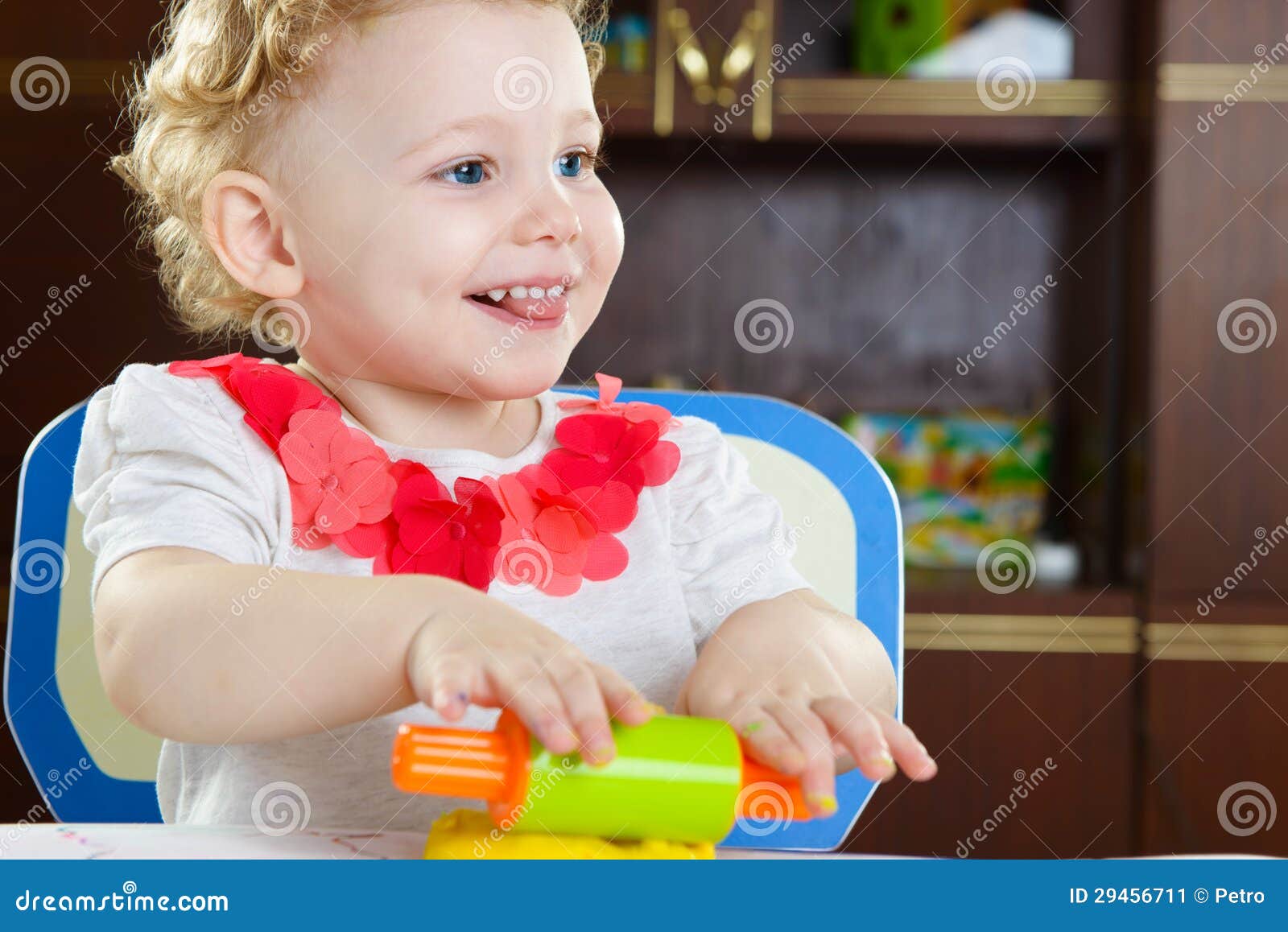 Cute Smiling Girl Rolling Plastiline Dough Stock Image - Image of ...