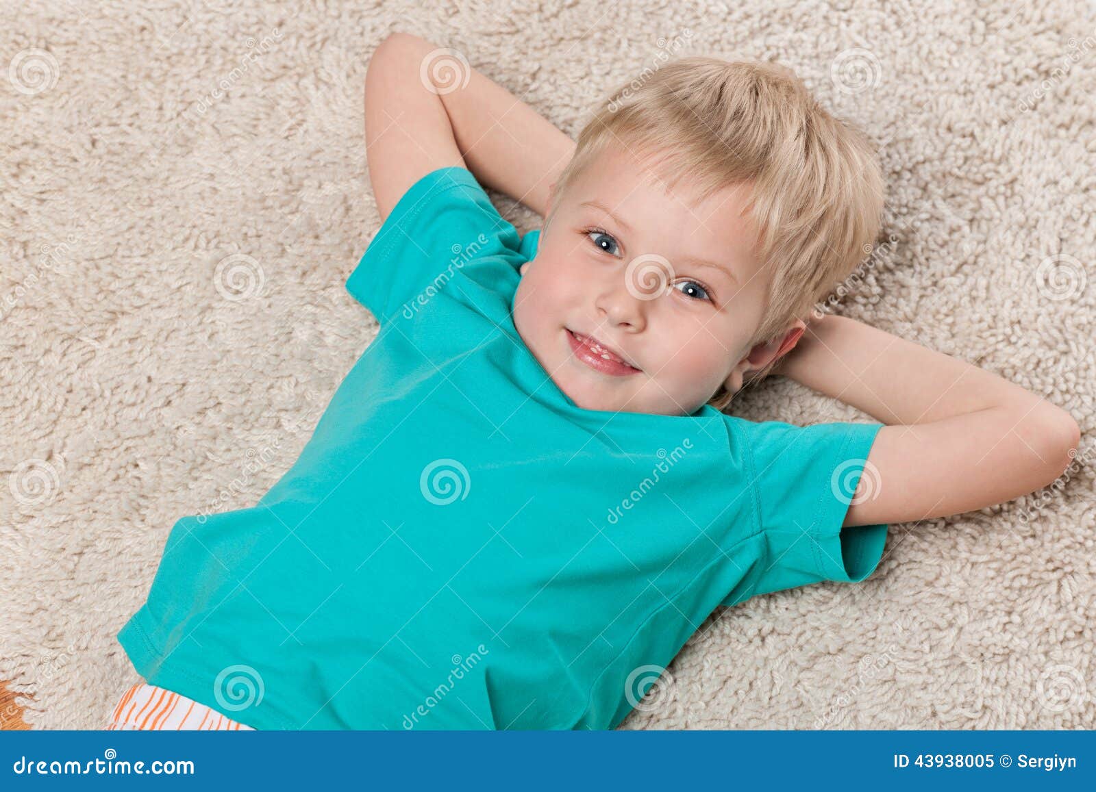 Cute Smiling Little Boy Resting Stock Image - Image of small, floor ...