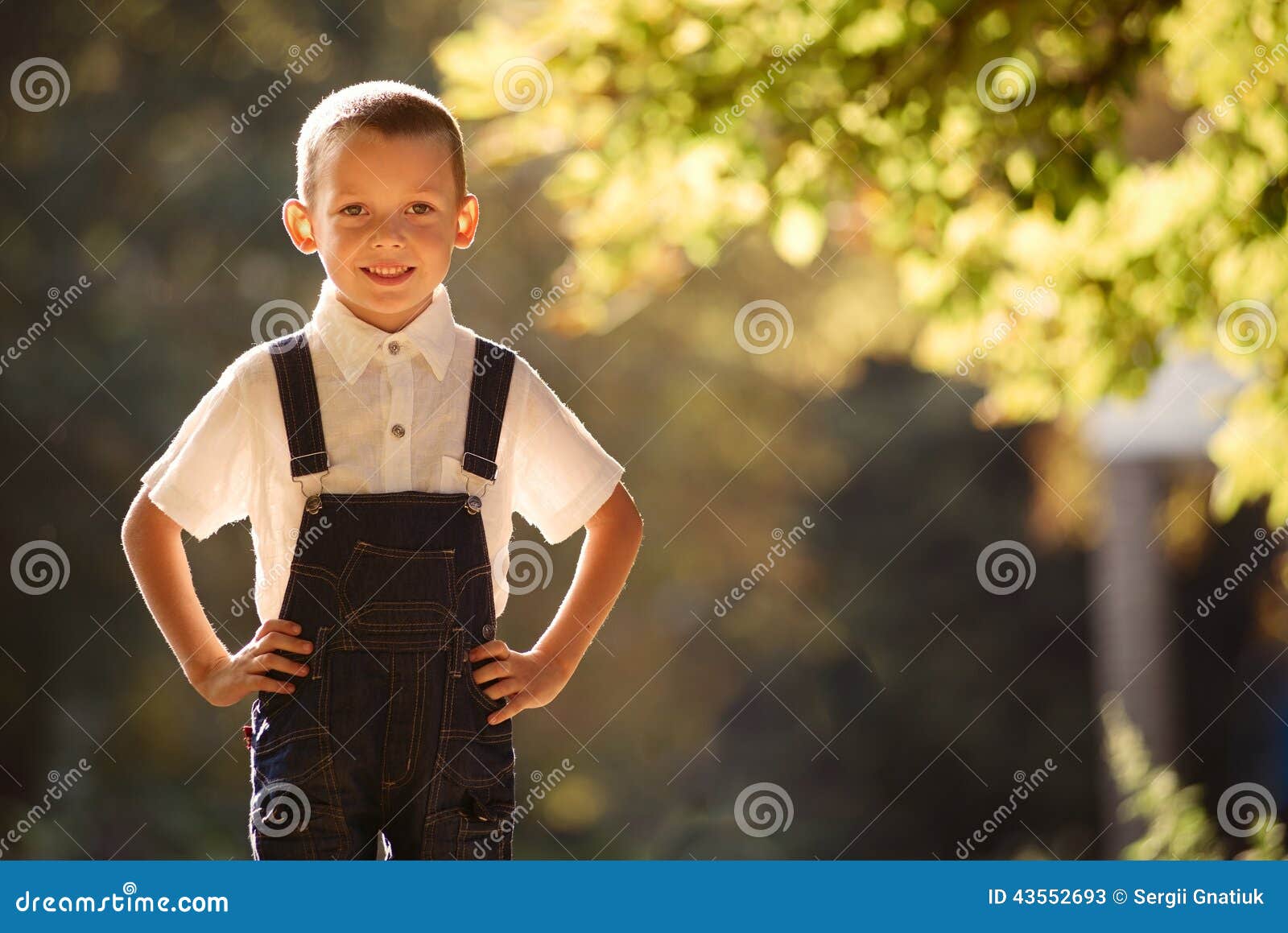 Cute Smiling Young Boy Backlit by the Sun Stock Image - Image of spring ...