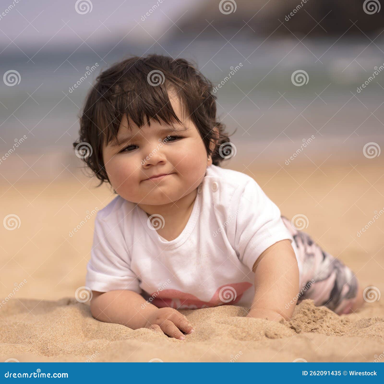 Cute Spanish Baby Playing on Sandy Beach Stock Image - Image of ocean ...