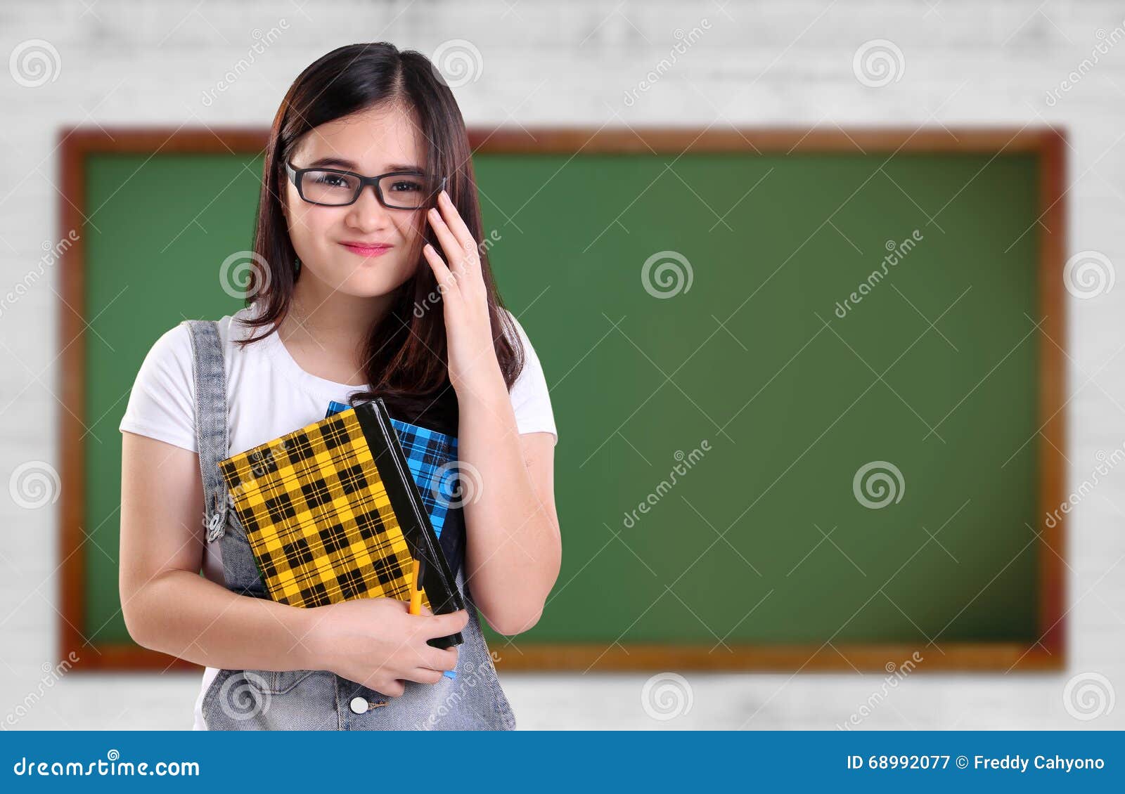 Cute student in a class stock image. Image of female - 68992077