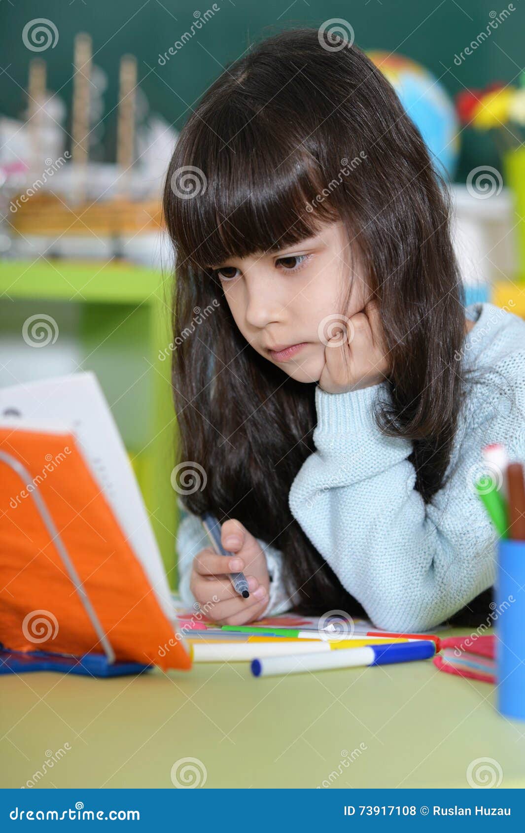 Cute student girl at class stock photo. Image of exam - 73917108