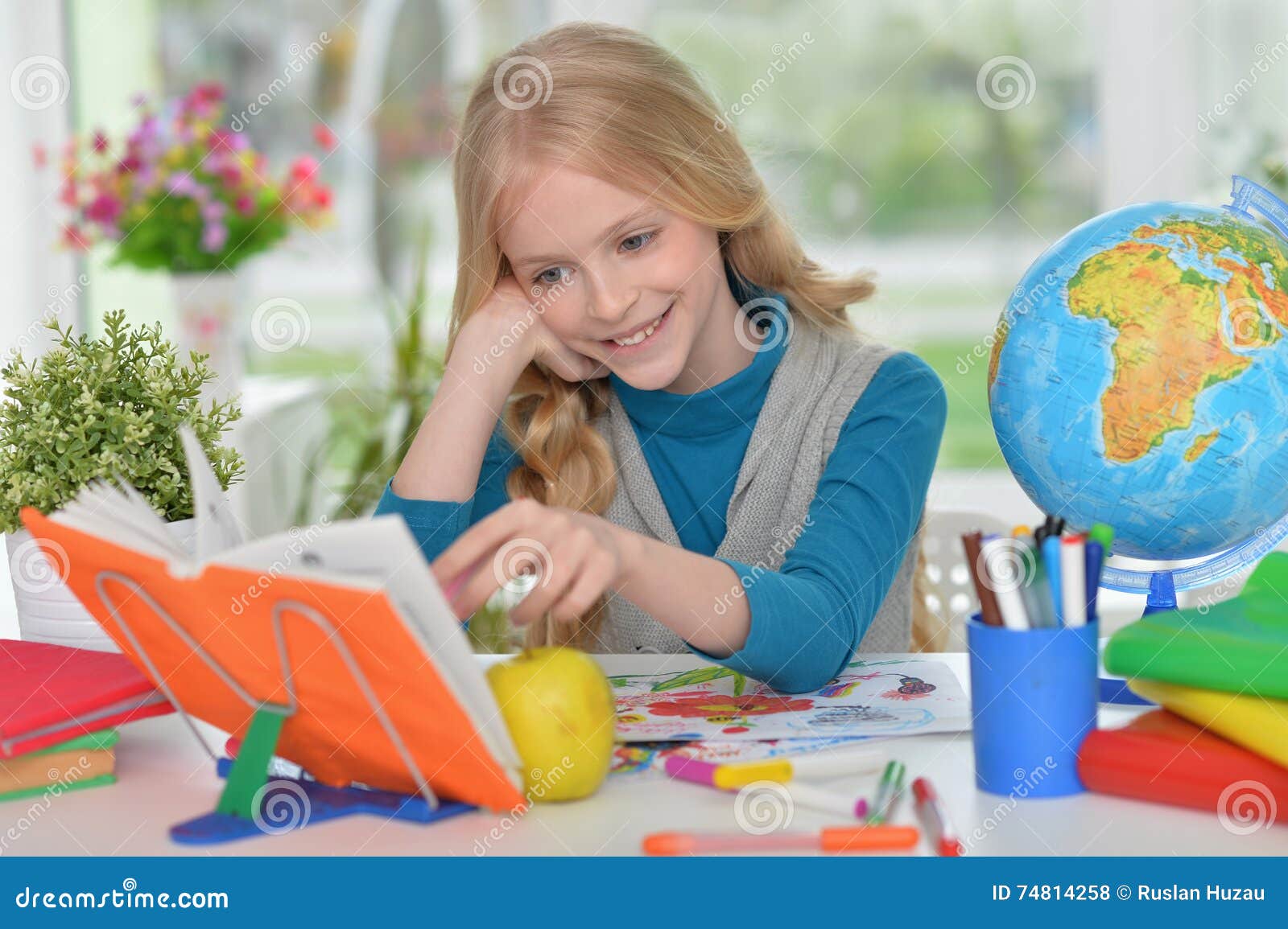 Cute student girl at class stock photo. Image of book - 74814258