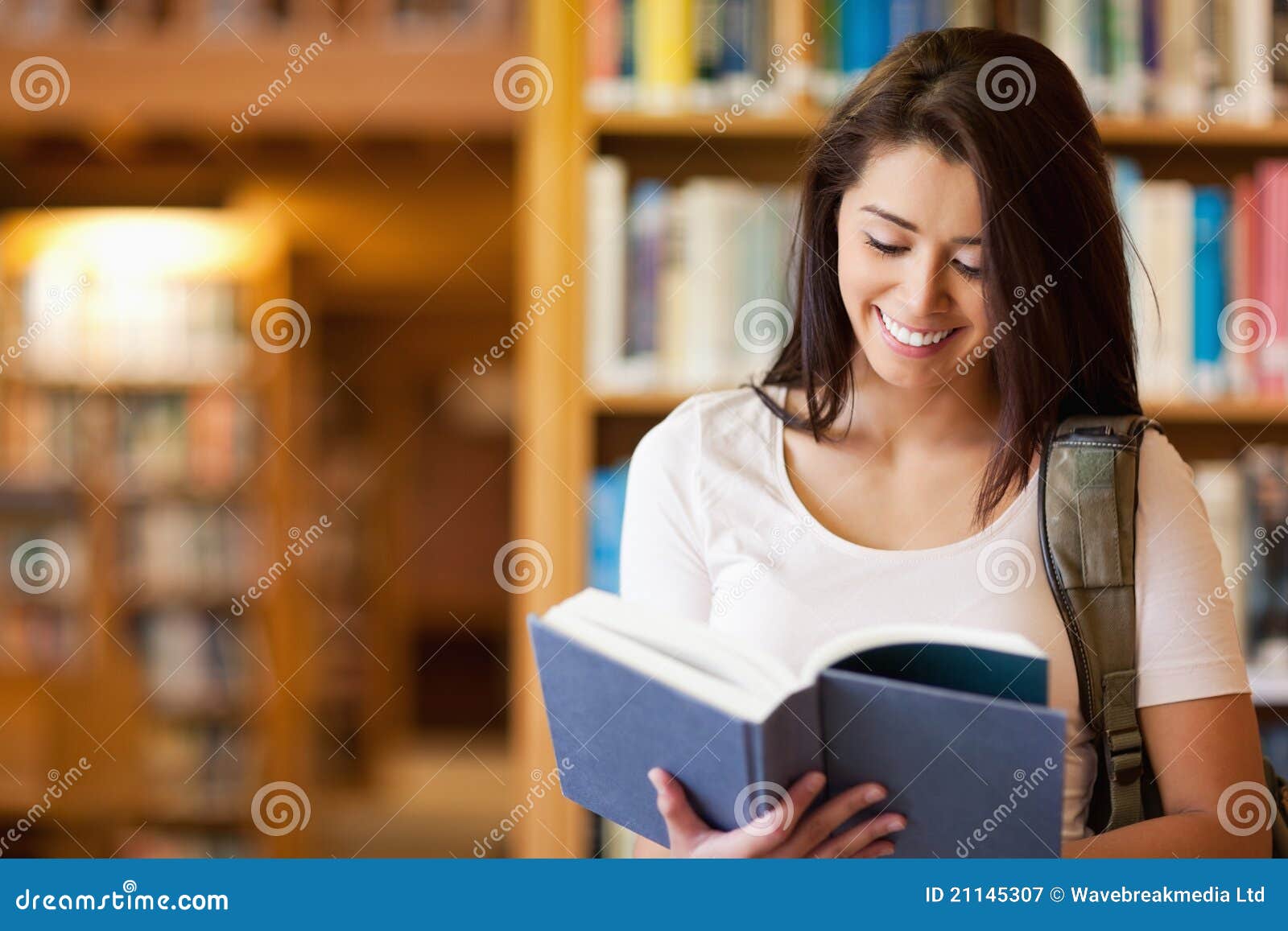 Cute Student Reading a Book Stock Image - Image of hold, happy: 21145307
