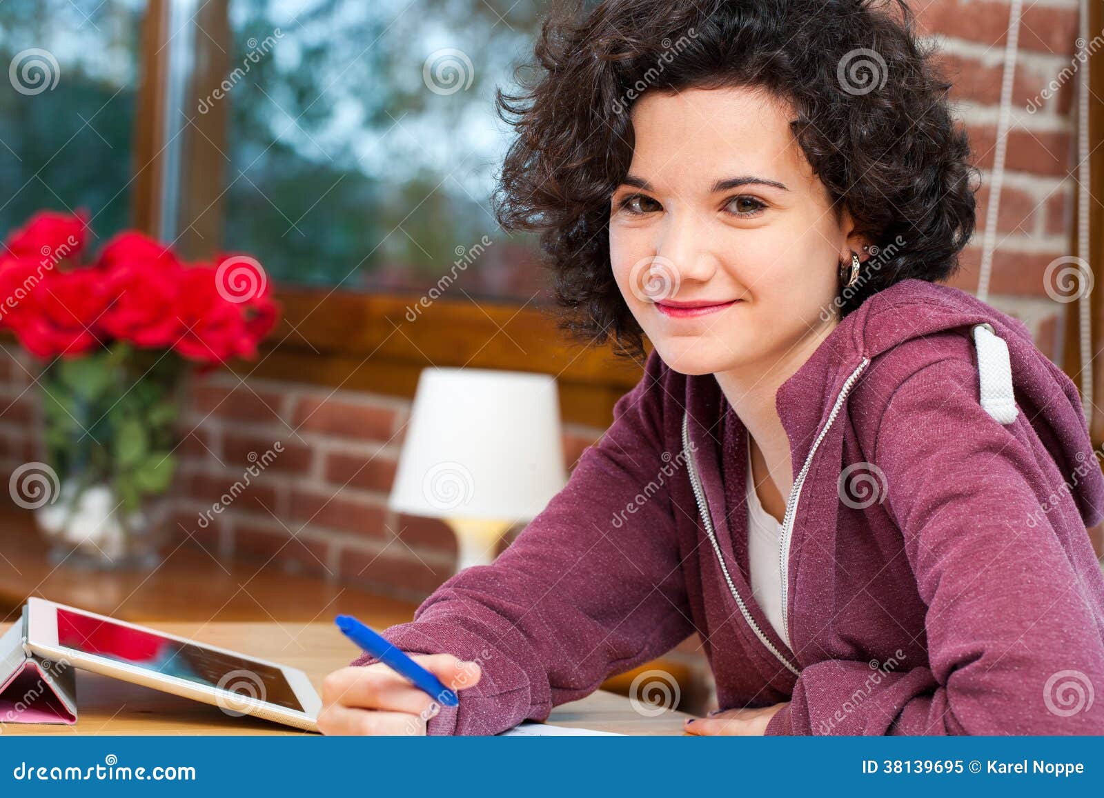 Cute Student Sitting at Table with Homework. Stock Image - Image of ...