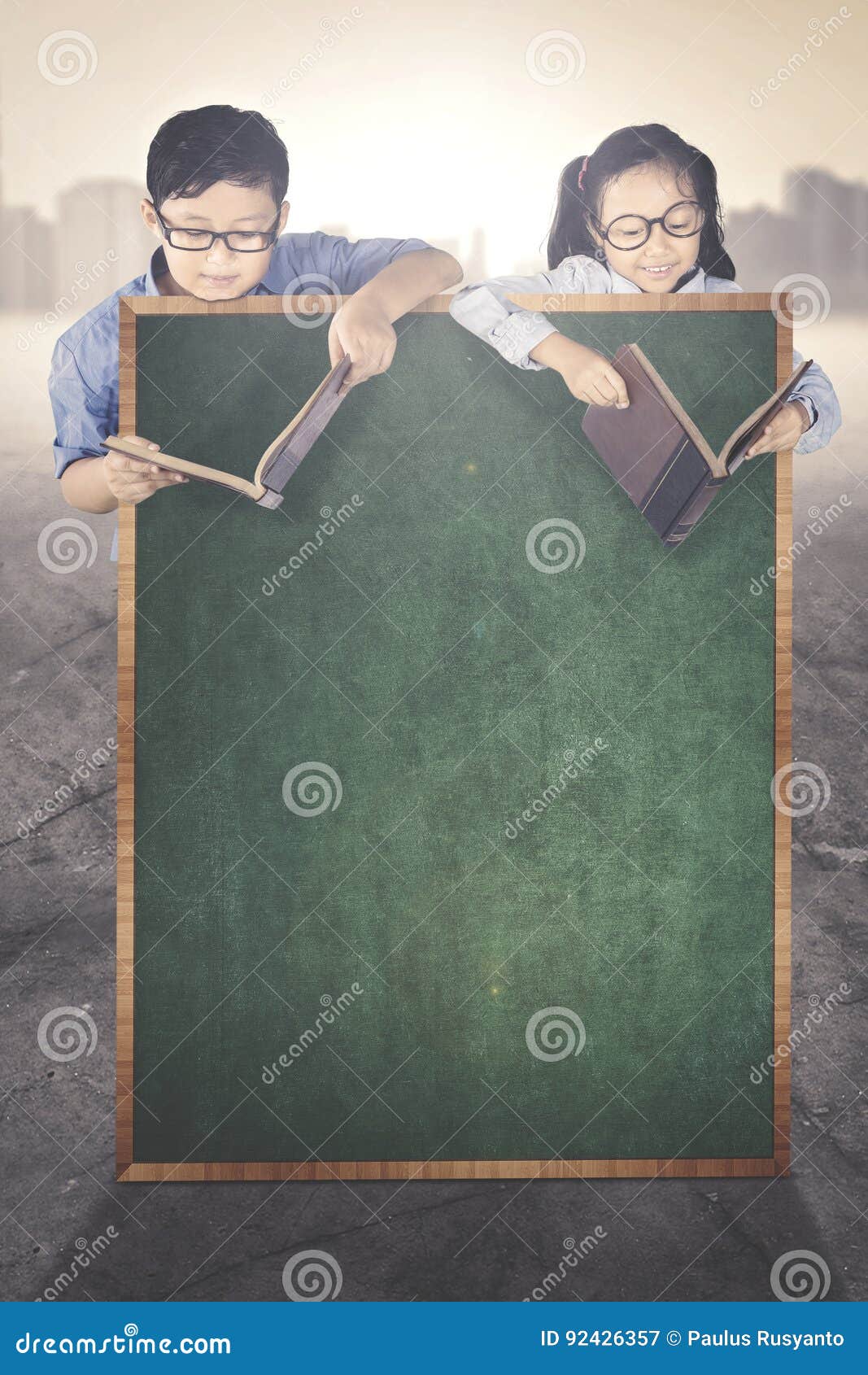 Cute Students Behind a Blank Chalkboard Stock Image - Image of ...