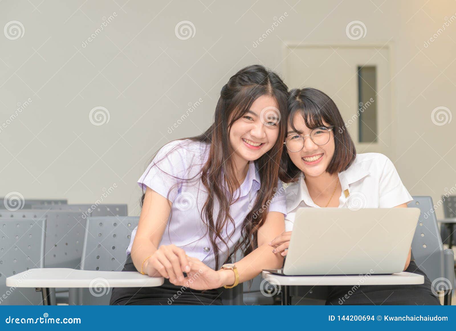 Cute Students Smile and Working with Laptop Stock Photo - Image of ...