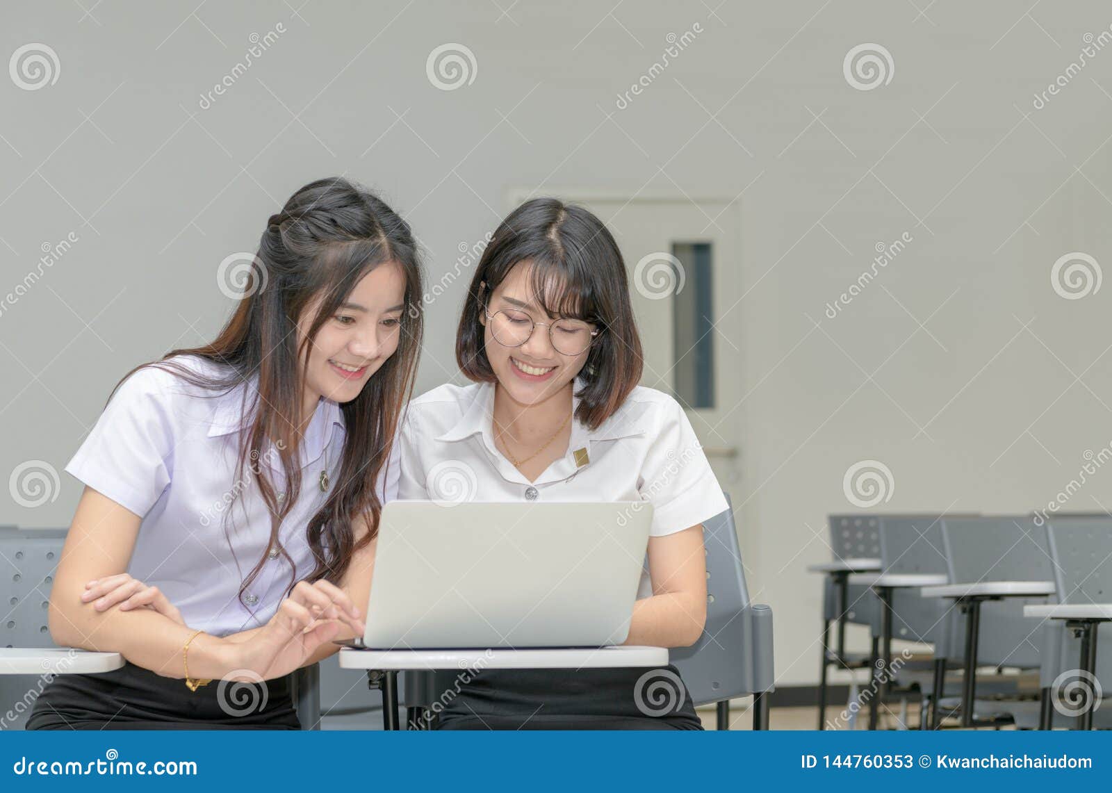 Cute Students in Uniform Working with Laptop Stock Image - Image of ...