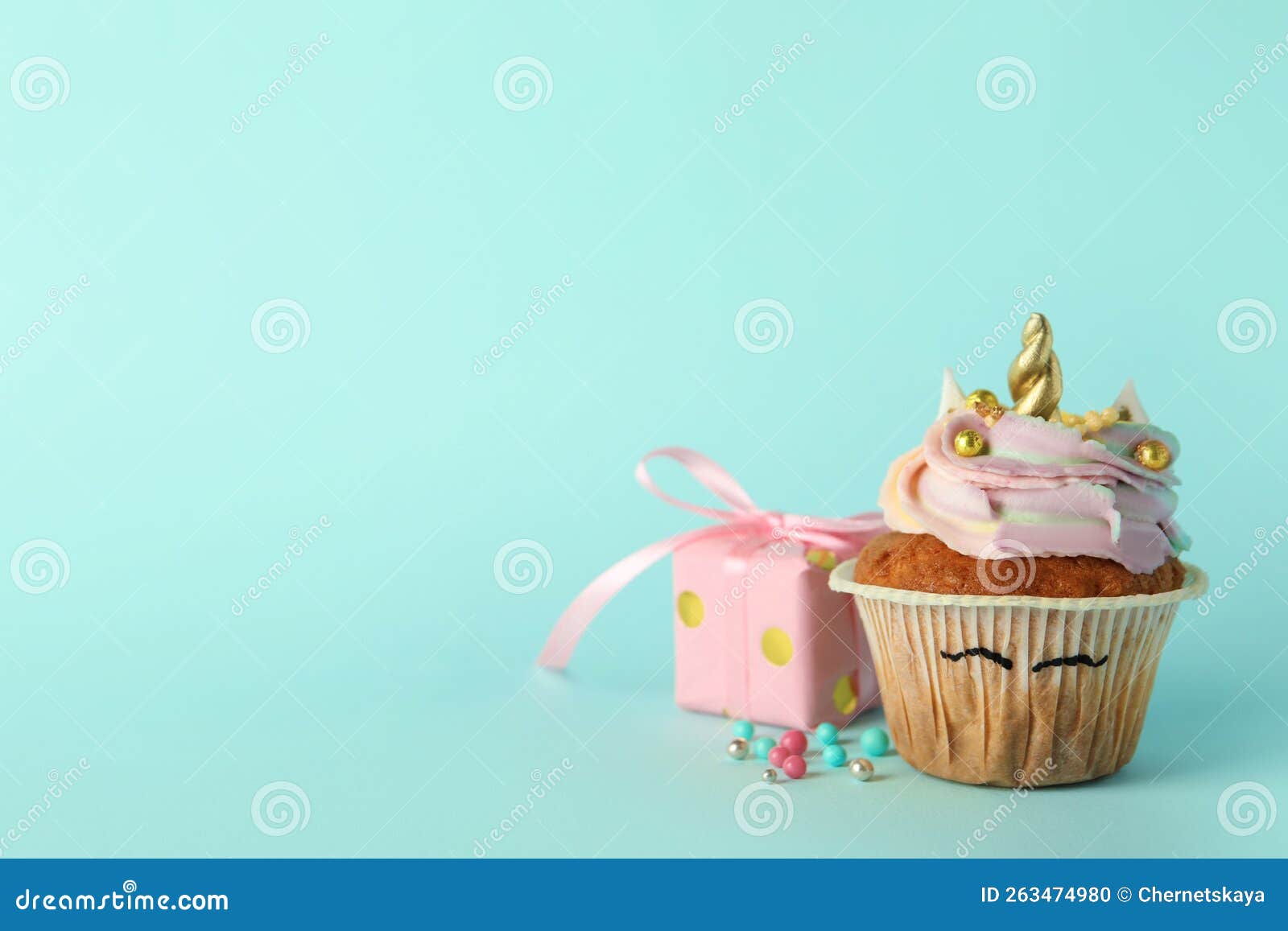 Cute Sweet Unicorn Cupcake and Gift Box on Light Turquoise Background ...