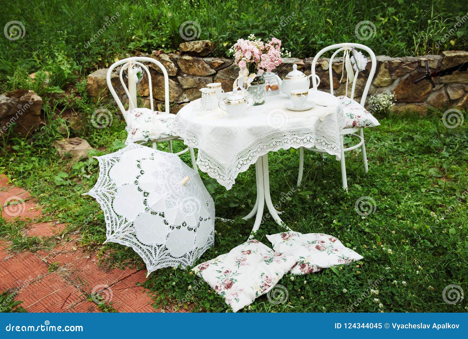 Picture of a Cute Table with Tableware for a Tea Stock Image - Image of ...