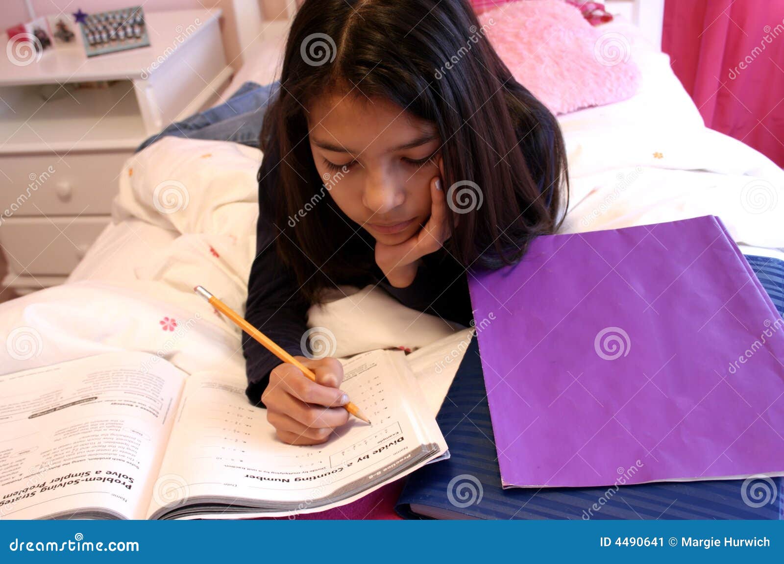 Cute teen doing homework stock image. Image of female - 4490641