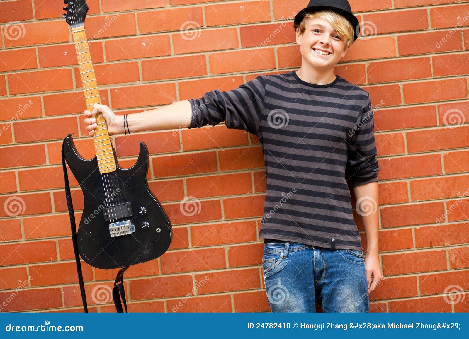 Cute teen musician stock photo. Image of playing, brick - 24782410