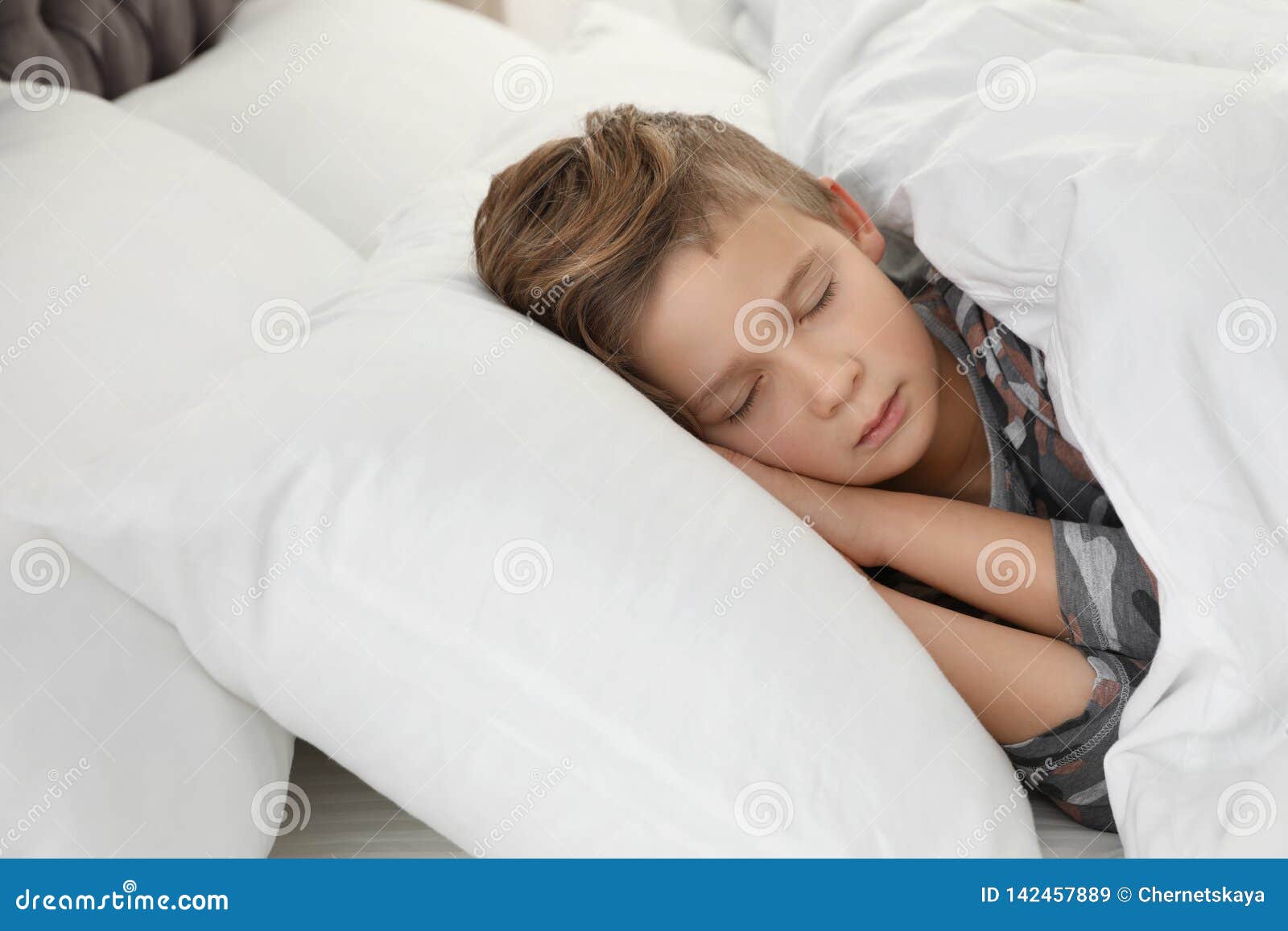Cute tired boy sleeping stock image. Image of funny - 142457889