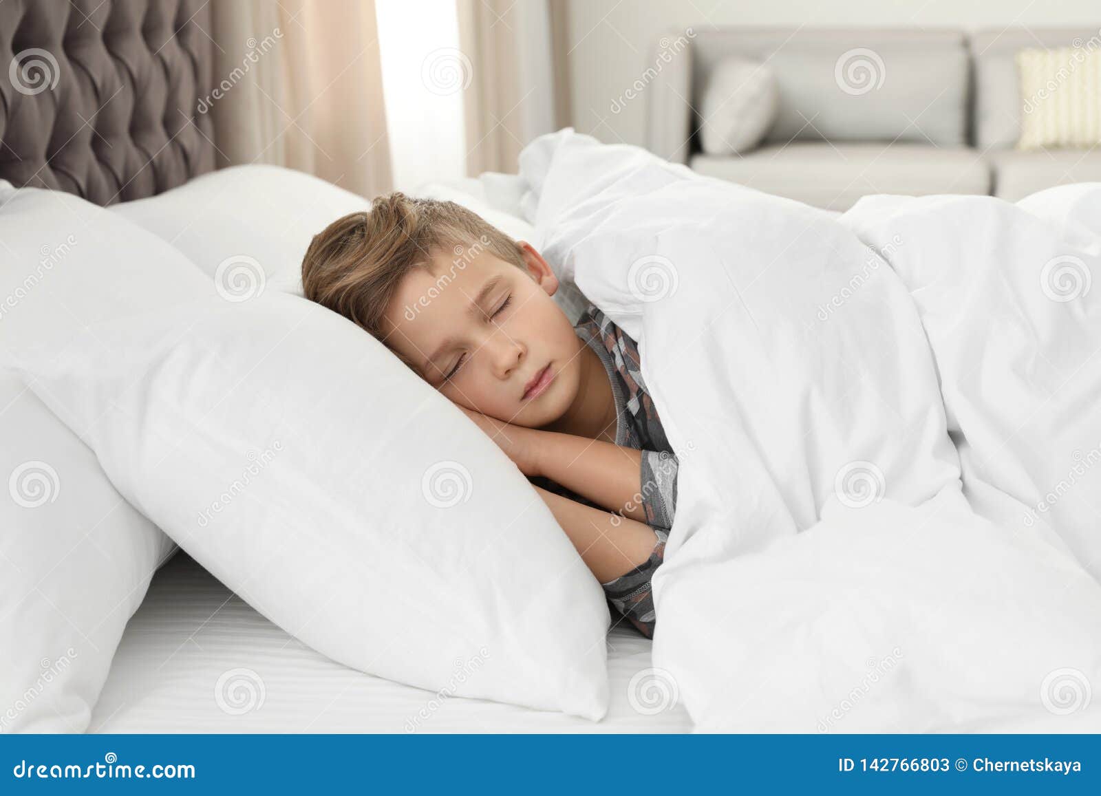 Cute tired boy sleeping stock image. Image of morning - 142766803