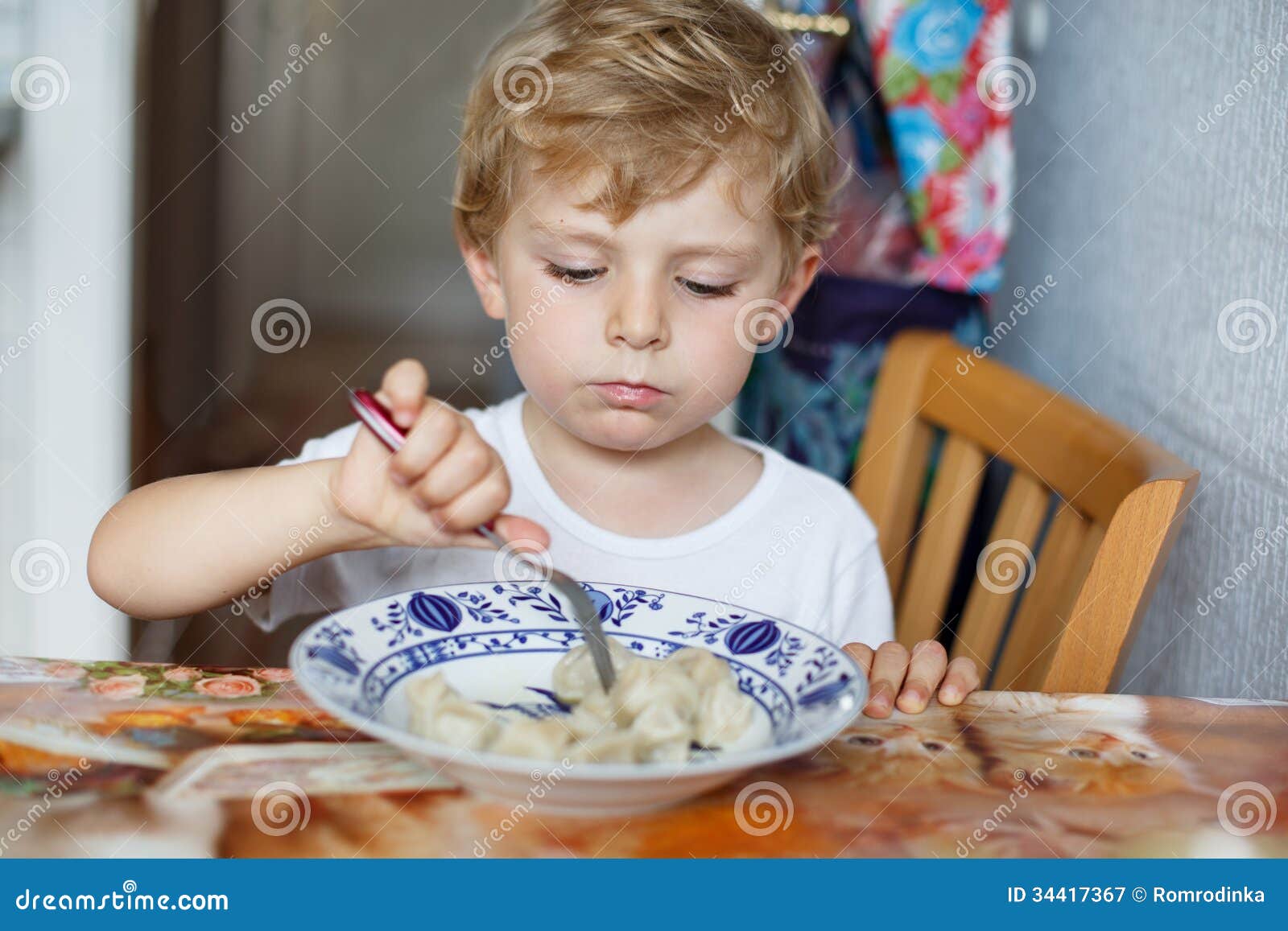 Cute Toddler Boy of Three Years Eating Pasta at Home Kitchen Stock ...
