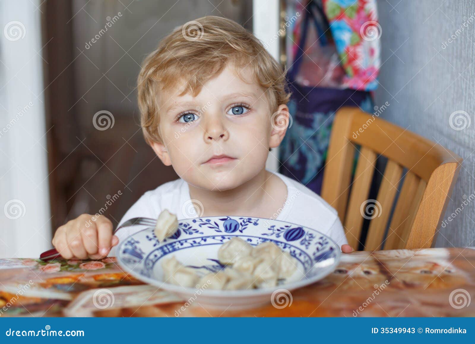 Cute Toddler Boy of Three Years Eating Pasta at Home Kitchen Stock ...