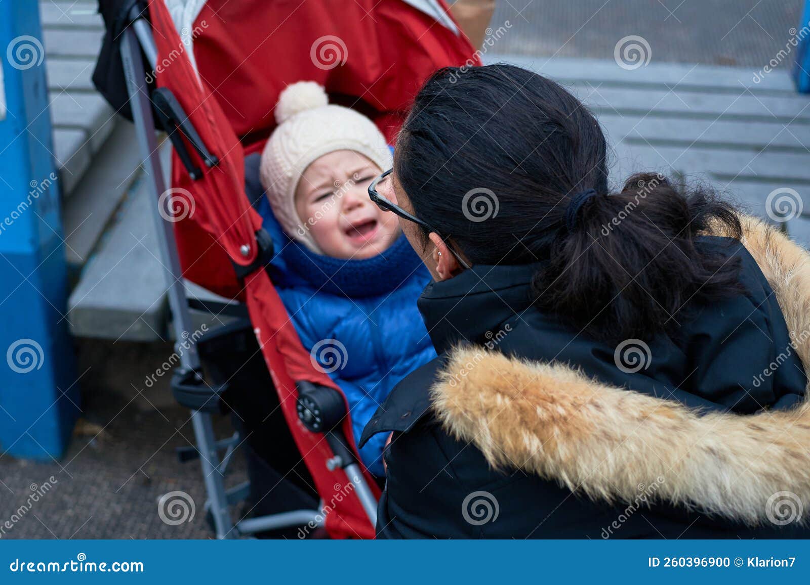 Cute Toddler Crying in the Stroller on the Playground Stock Photo ...