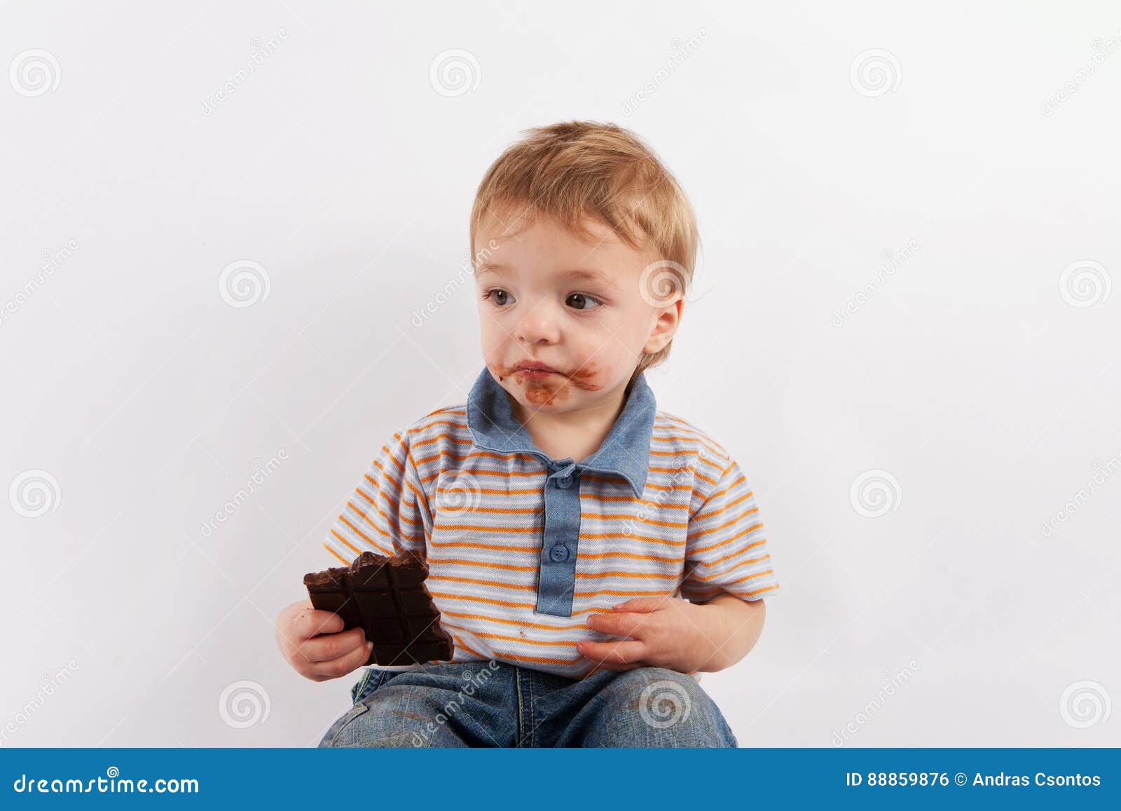 Cute Toddler Eating a Chocolate Bar Stock Photo - Image of tasty, candy ...