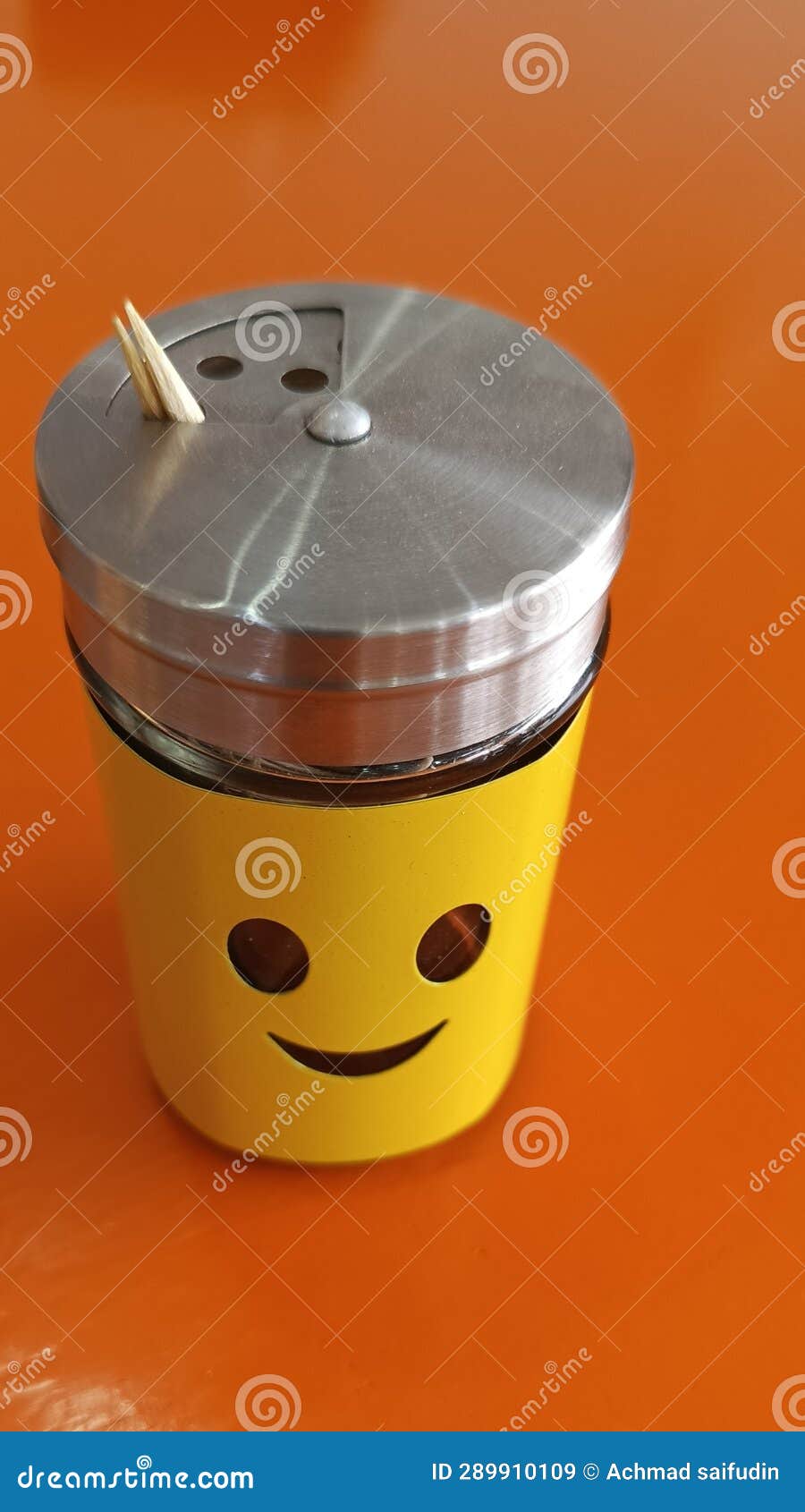 Cute Toothpick Container with Orange Background Stock Image - Image of ...