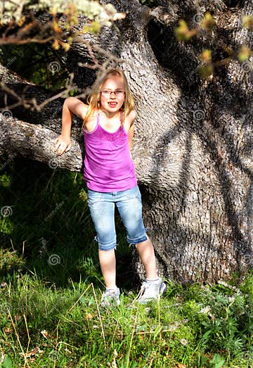 Cute Tween by Old Oak stock photo. Image of tree, youth - 24863894