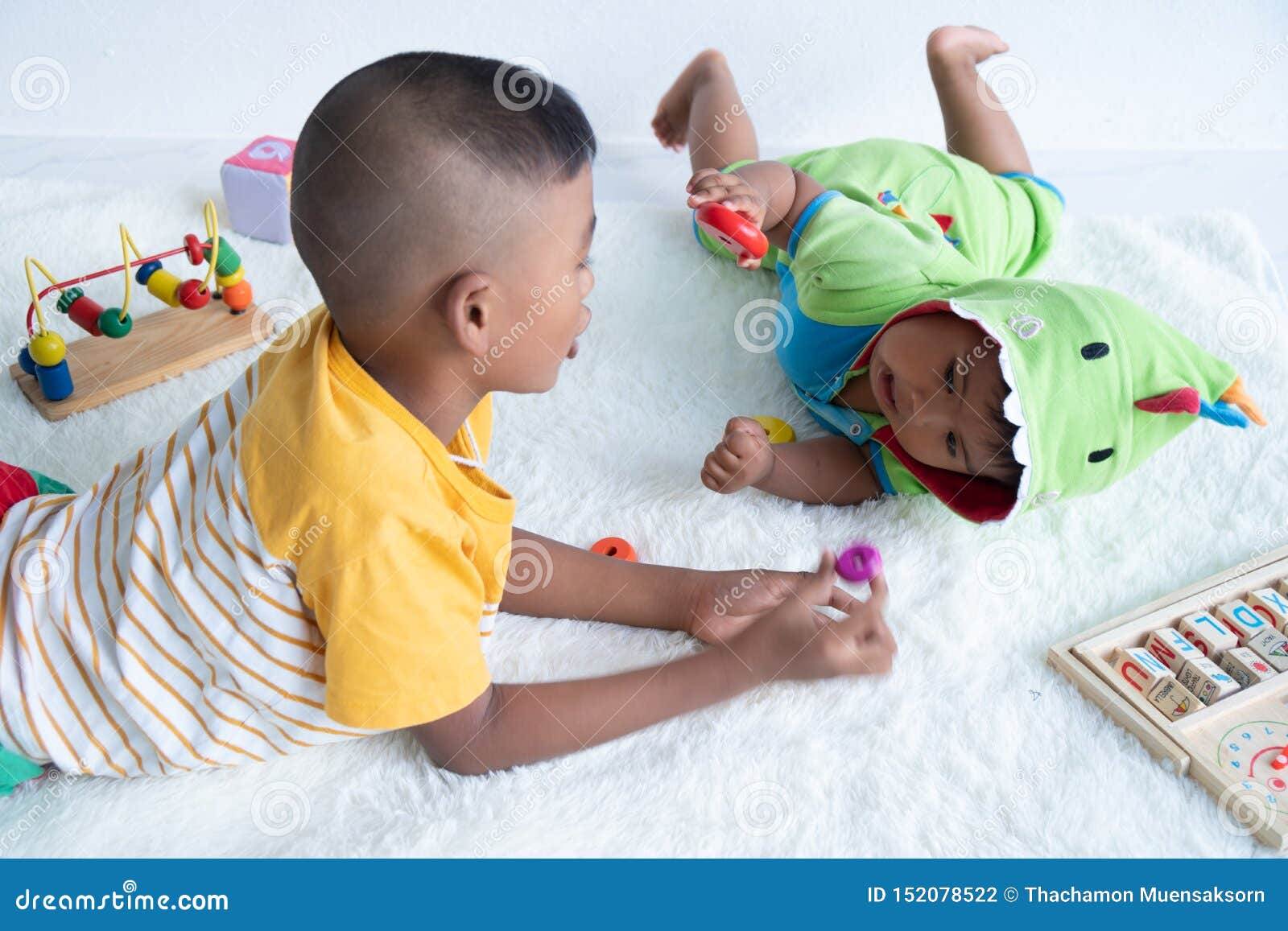 Cute Two Brother Play in Room Stock Photo - Image of children, lying ...