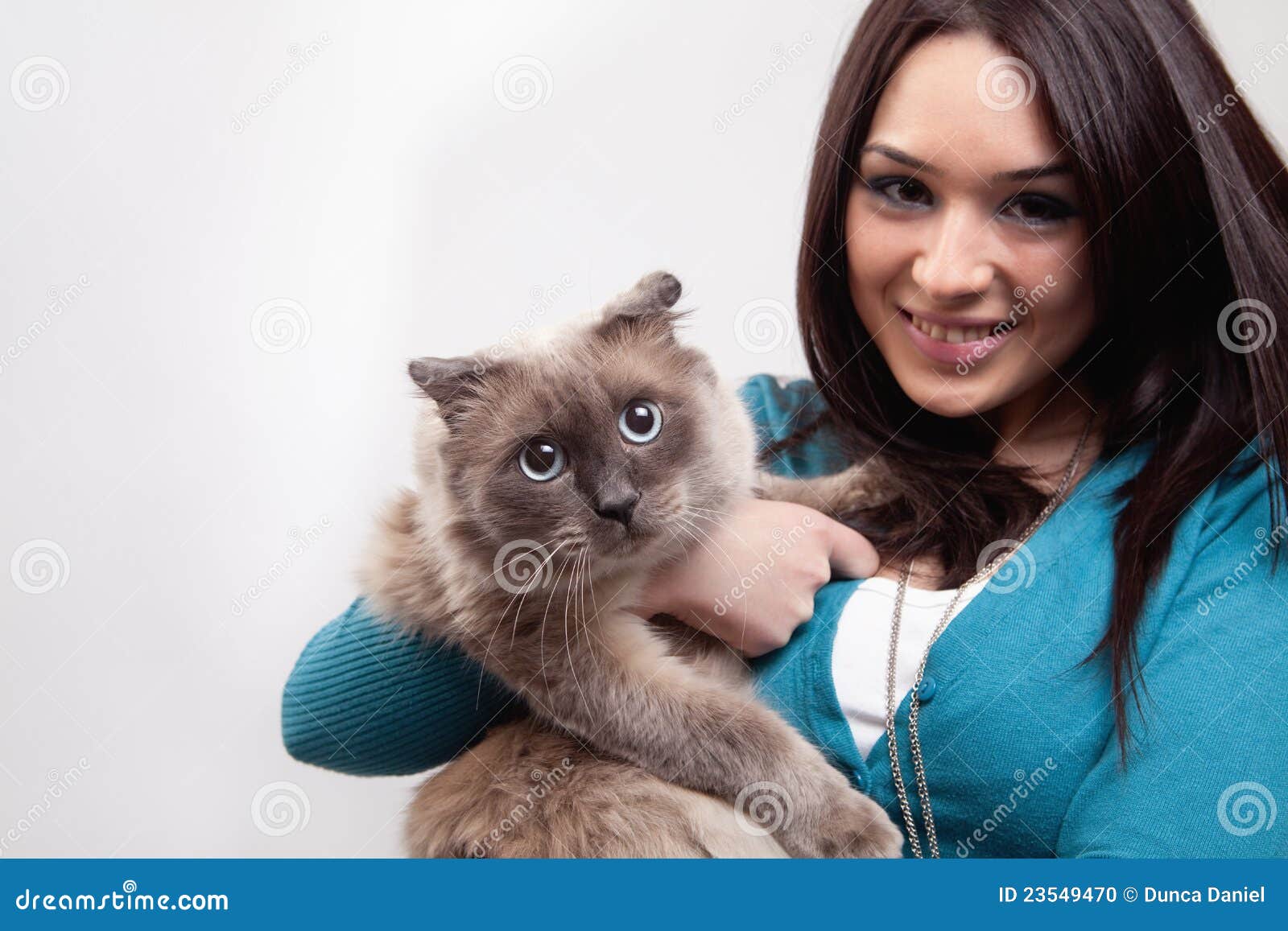 Cute woman and funny cat stock photo. Image of girl, look - 23549470