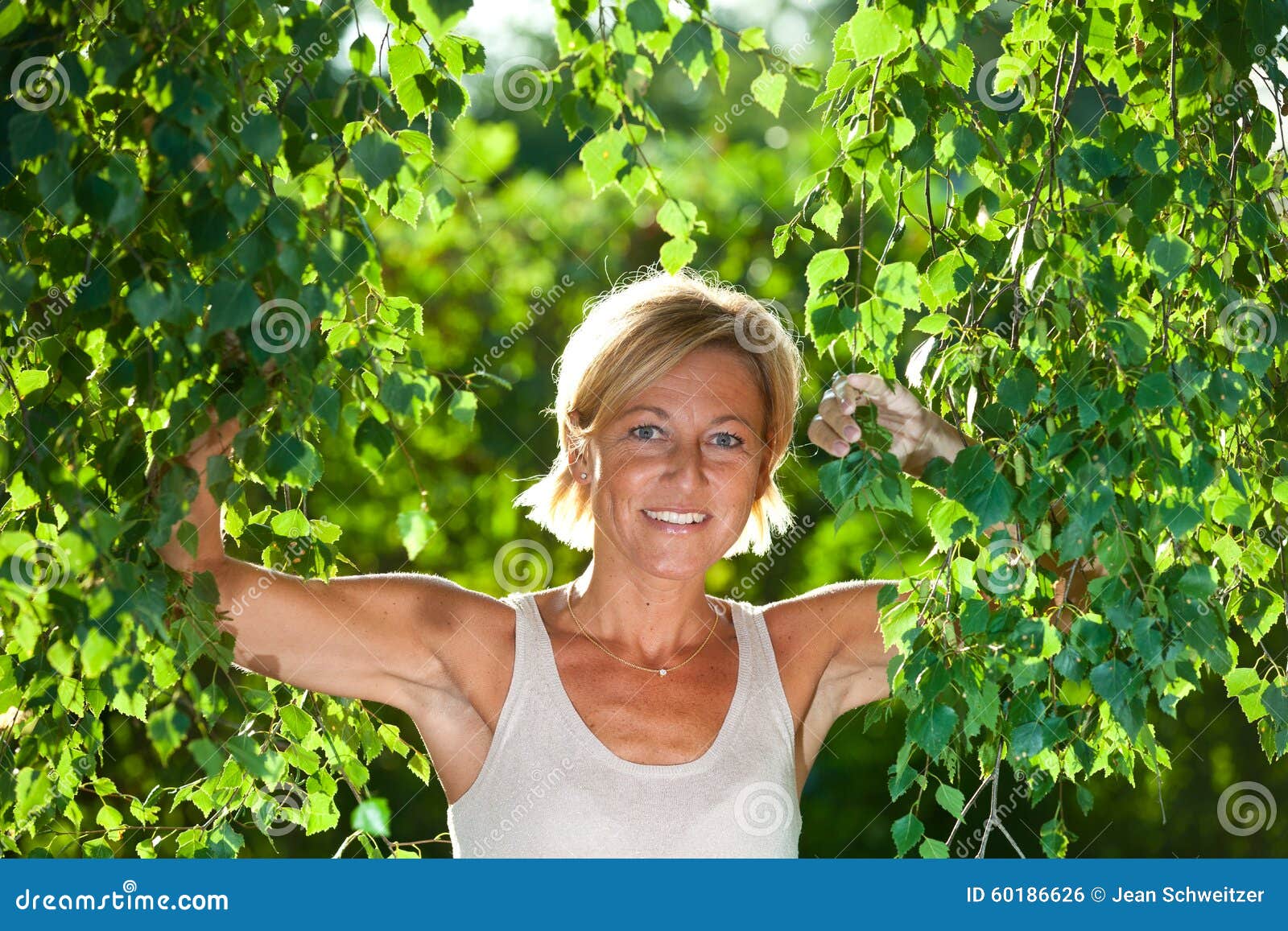 Cute Woman Portrait with Tree Branches Stock Photo - Image of happiness ...