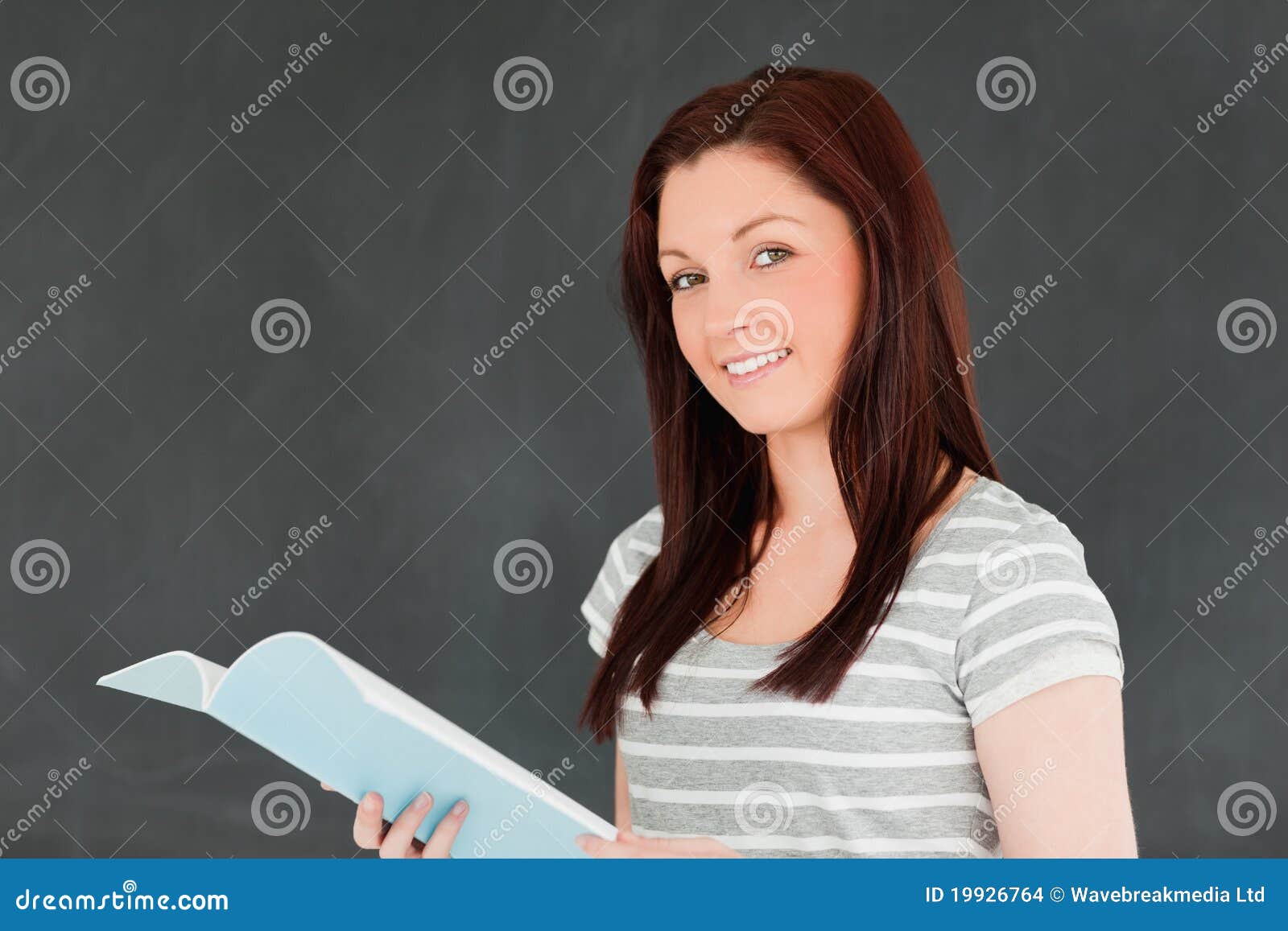 Cute Woman Reading Her Notes Stock Photo - Image of indoors, girl: 19926764