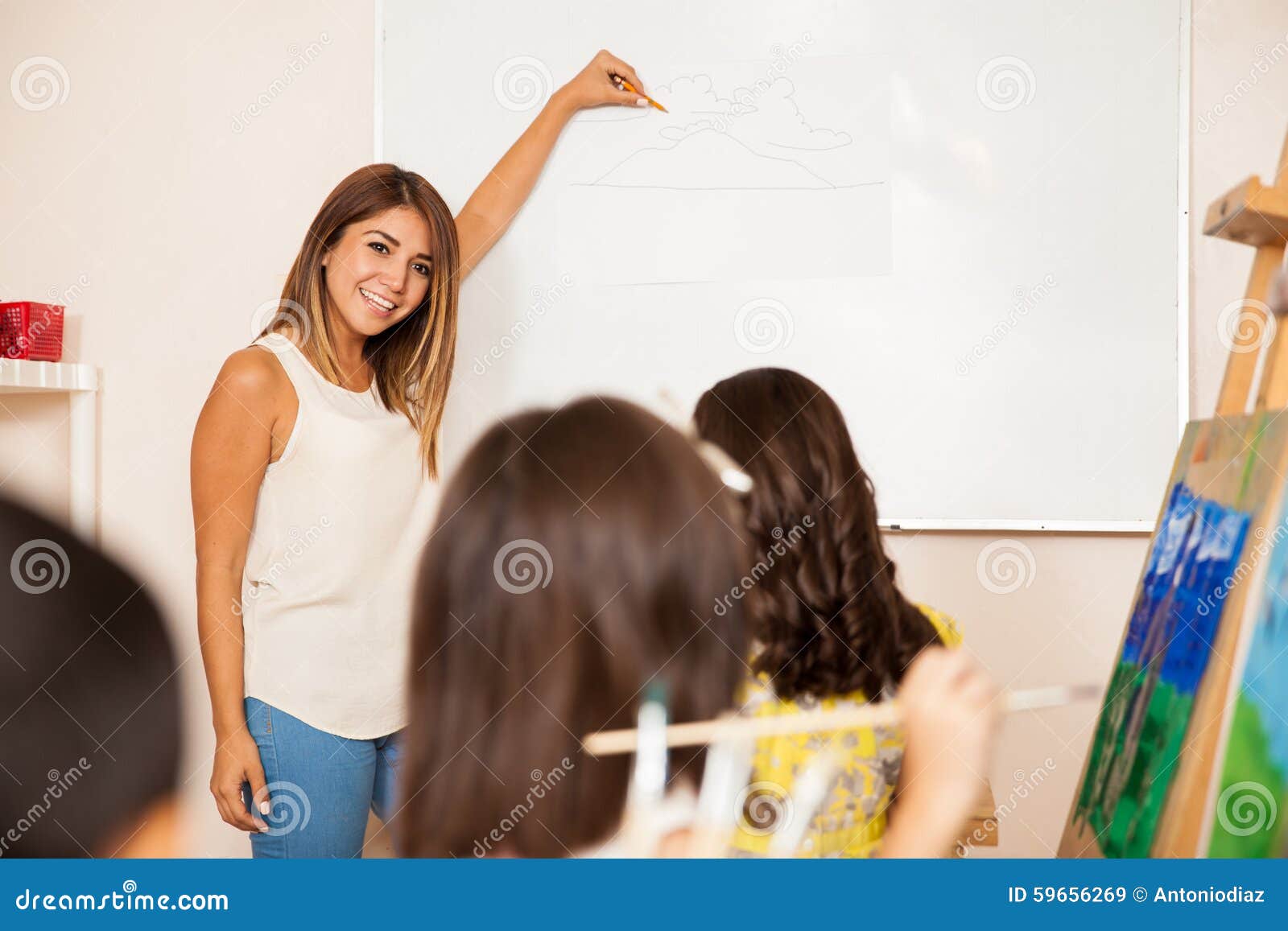 Cute Woman Teaching Art Class Stock Image - Image of school, indoor ...