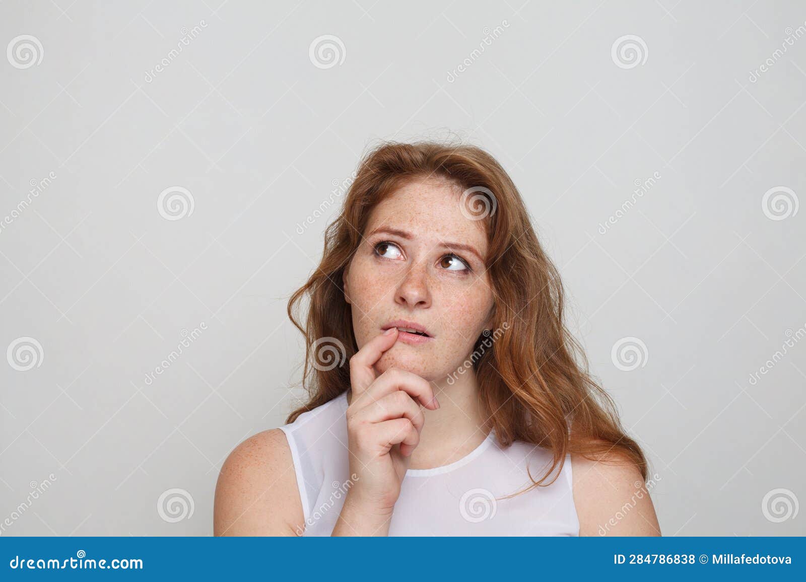 Cute Woman Thinking on White Background Stock Photo - Image of ...