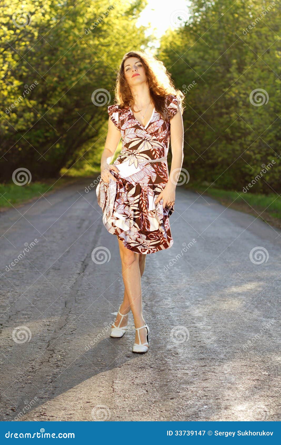 Cute Woman Walking on the Road Stock Image - Image of green, elegance ...