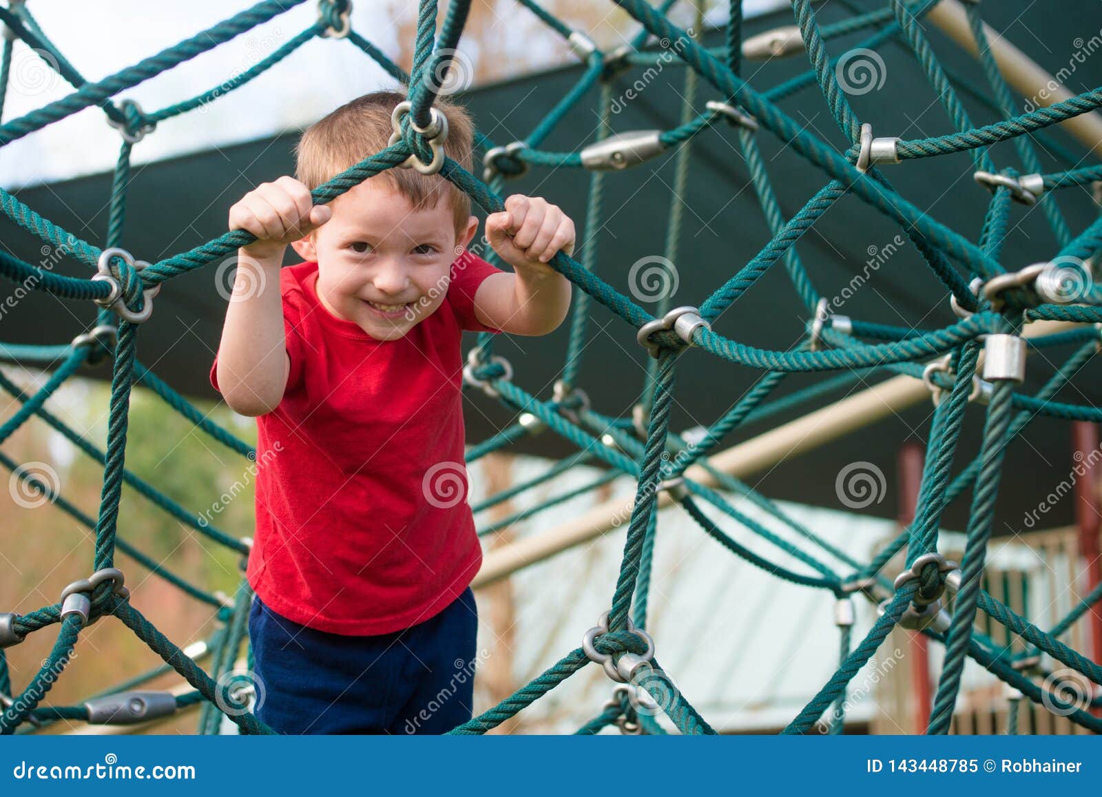 Boy on playground stock image. Image of happiness, laughing - 143448785