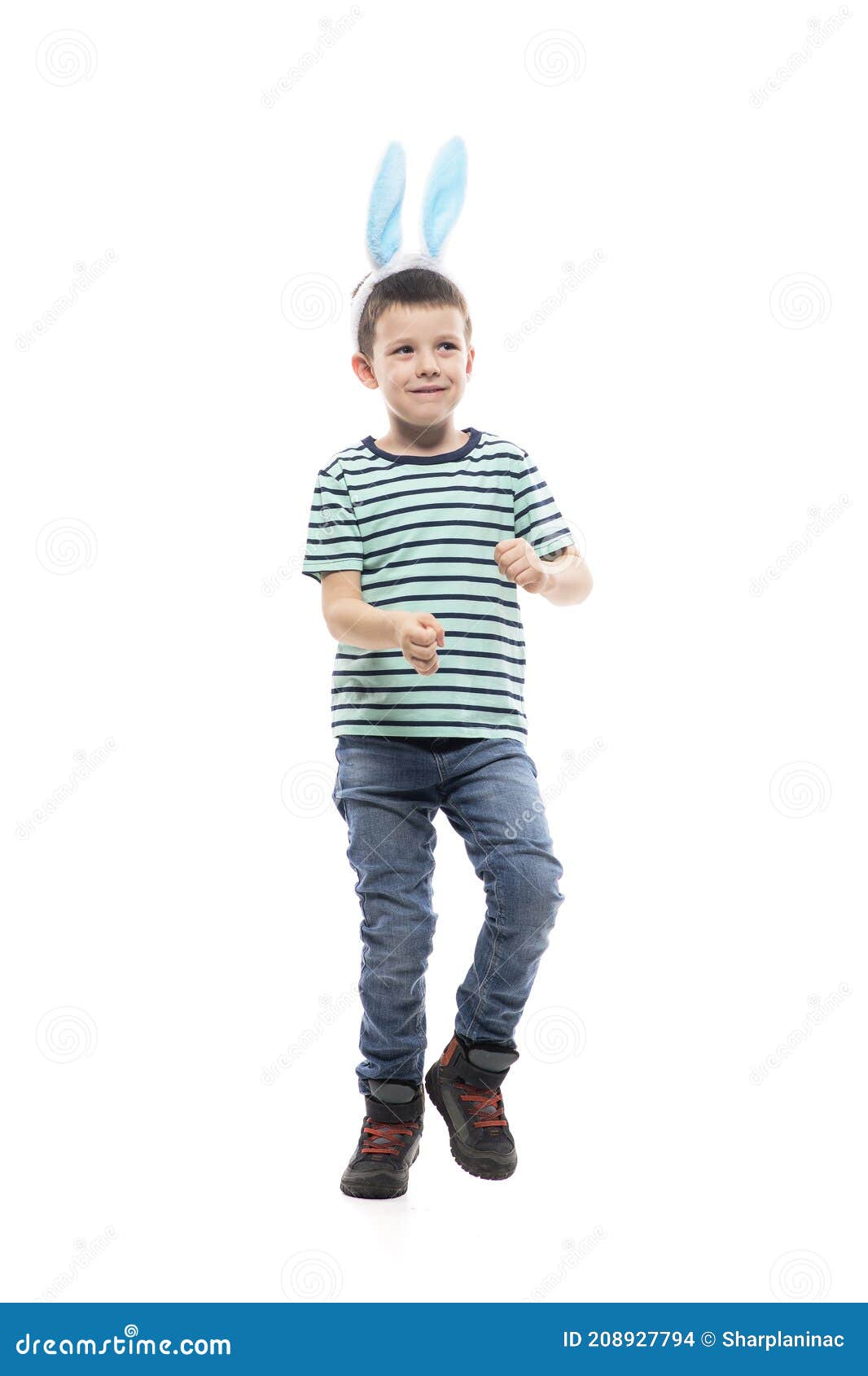 Cute Young Boy with Easter Bunny Ears Dancing Joyfully Having Fun ...